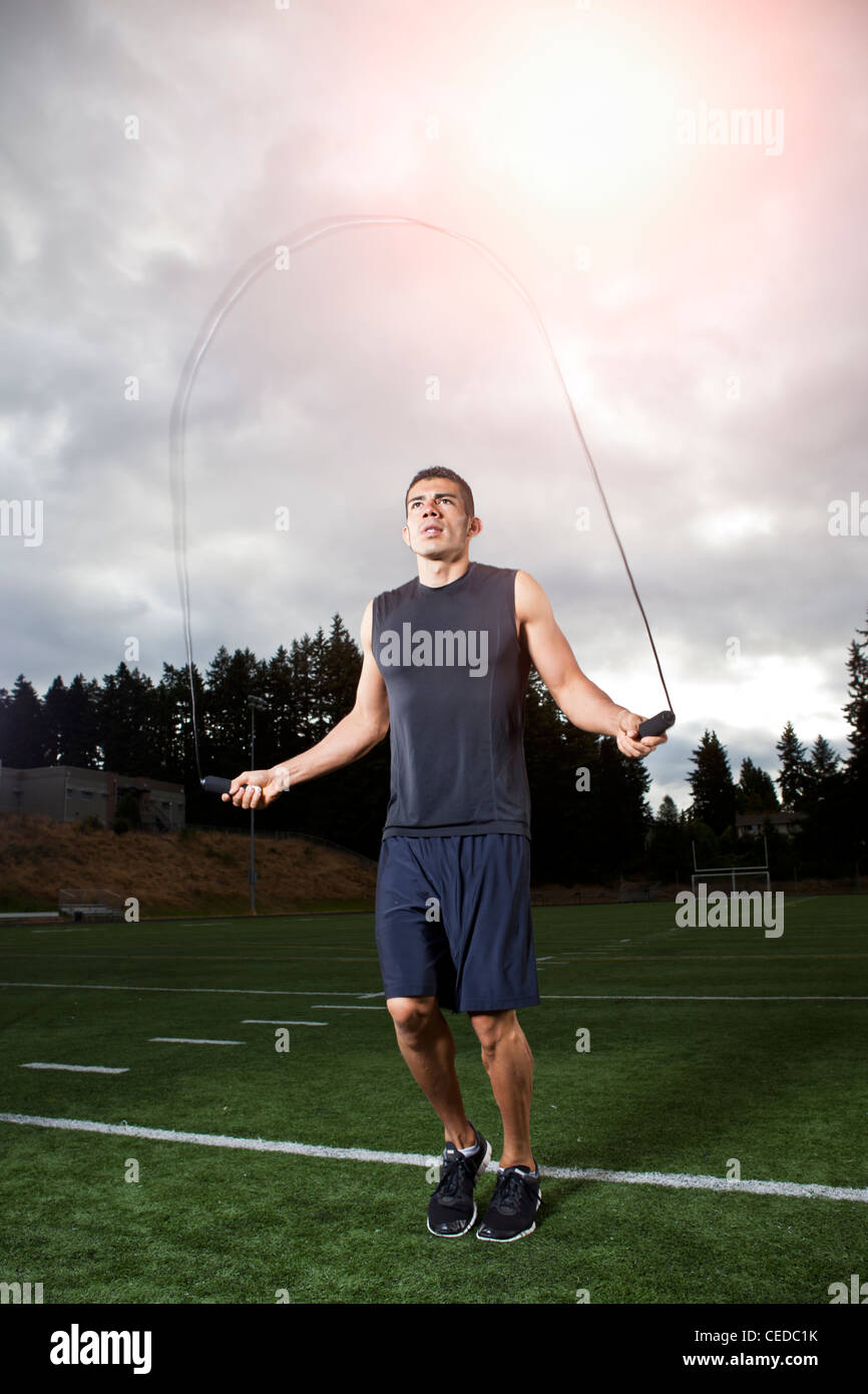 Man jumping on jump rope hi-res stock photography and images - Alamy