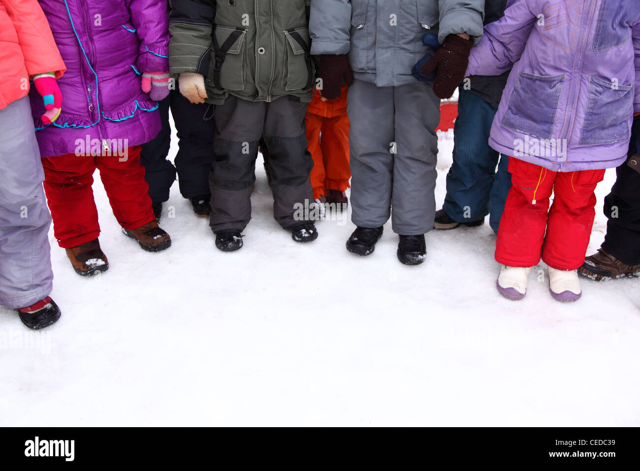 Children stand around Stock Photo - Alamy