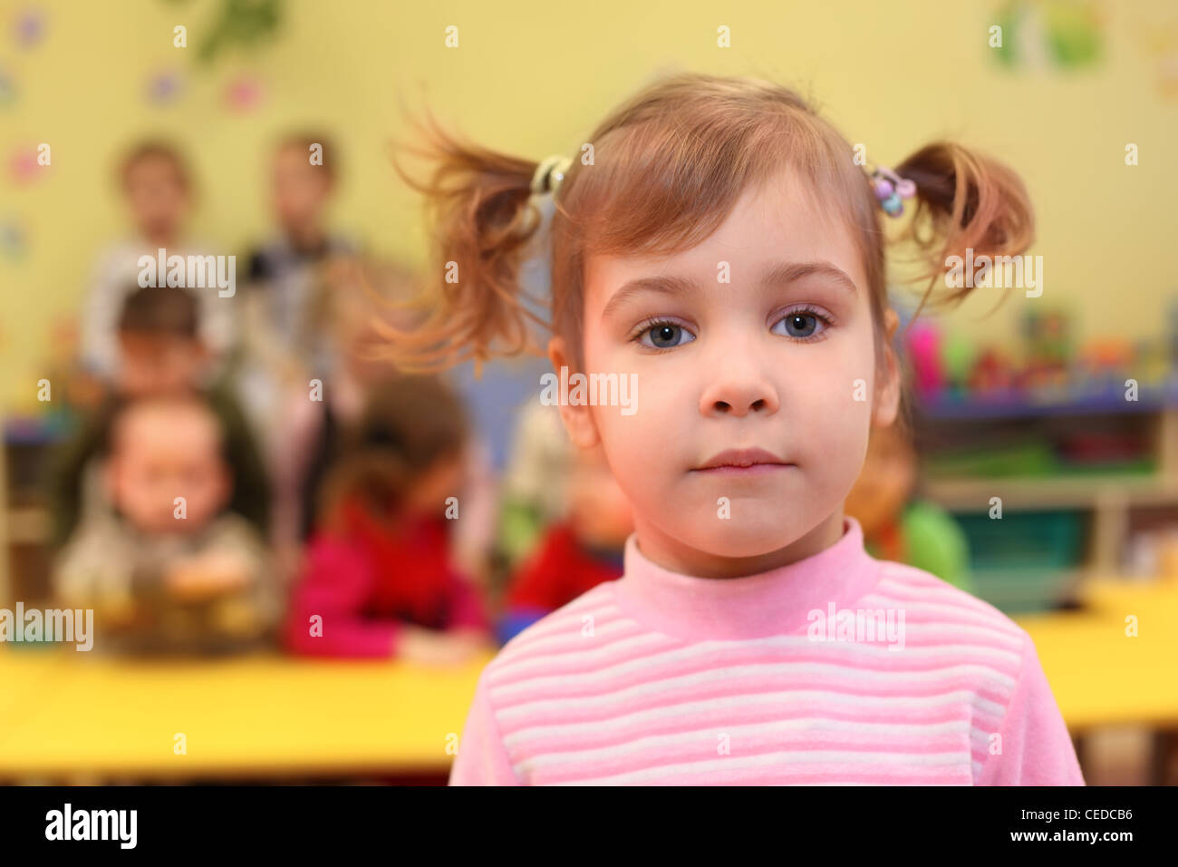 Little girl in kindergarten Stock Photo - Alamy