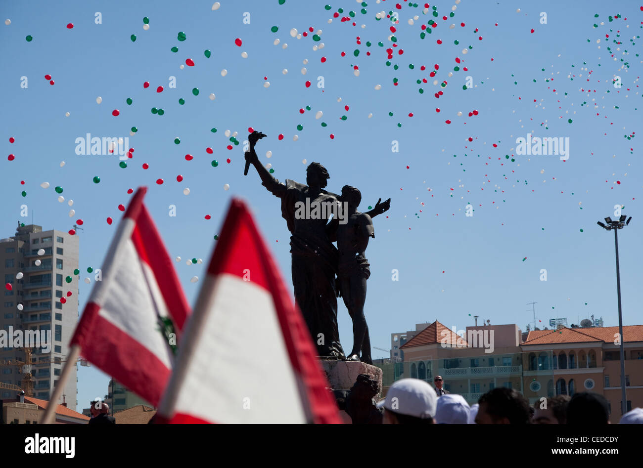 Balloons fly over the Martyrs Square statue in Beirut, Lebanon, at a ...
