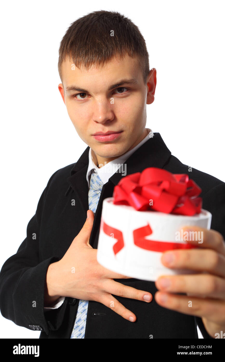young businessman gives box with gift Stock Photo - Alamy