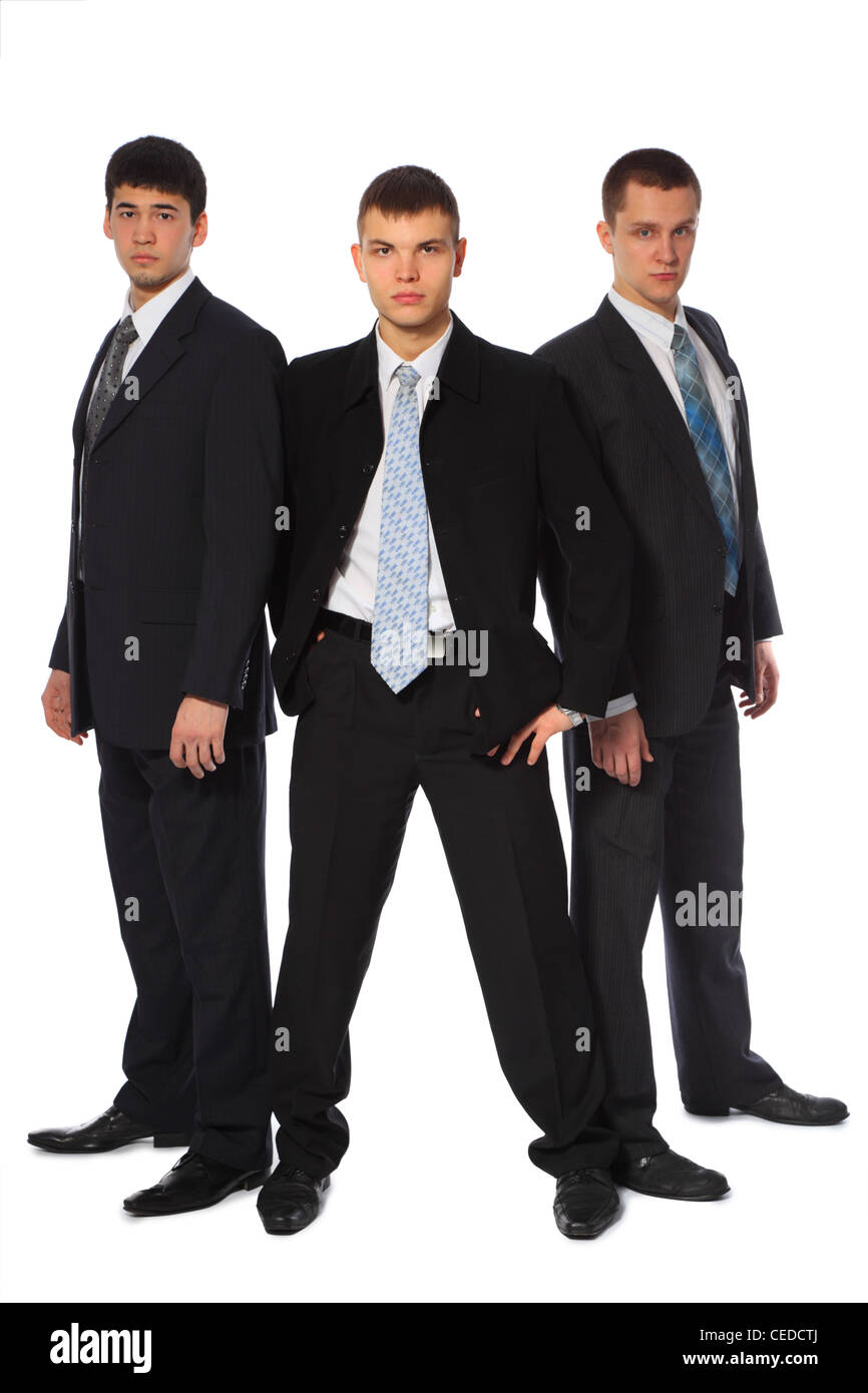 Three young businessmen stand semicircle Stock Photo - Alamy