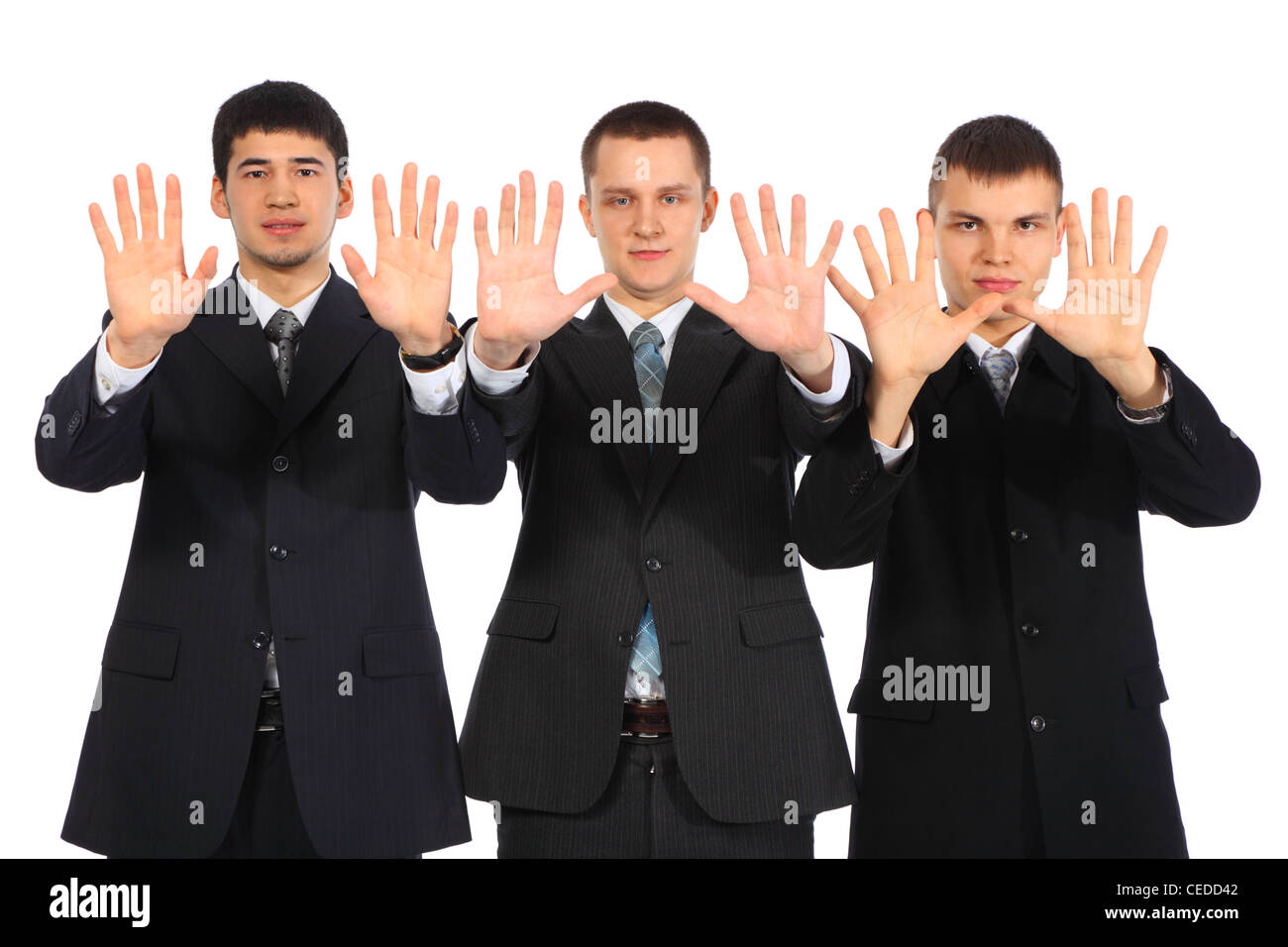 Three young businessmen show open palms Stock Photo - Alamy