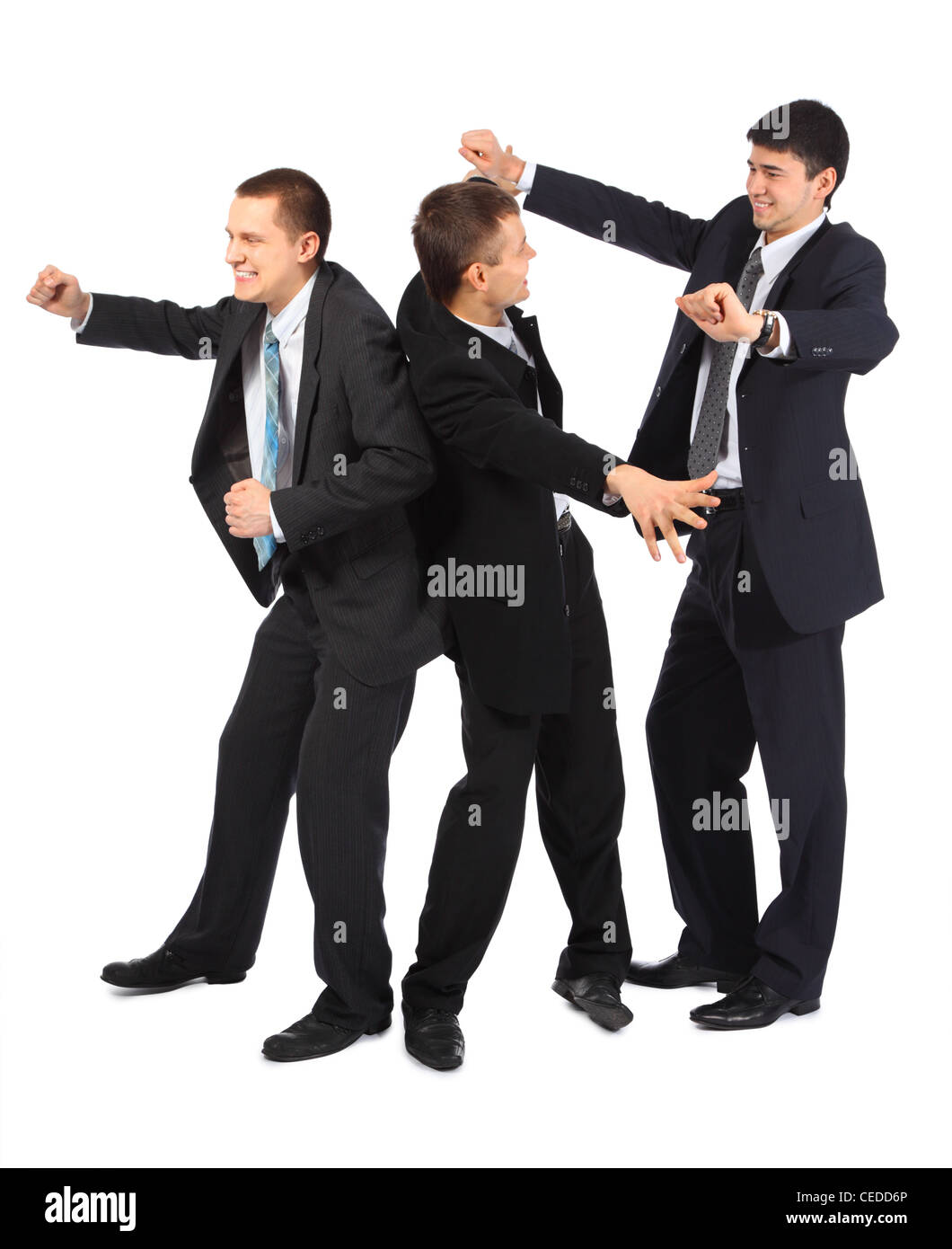 Dancing three young businessmen Stock Photo - Alamy