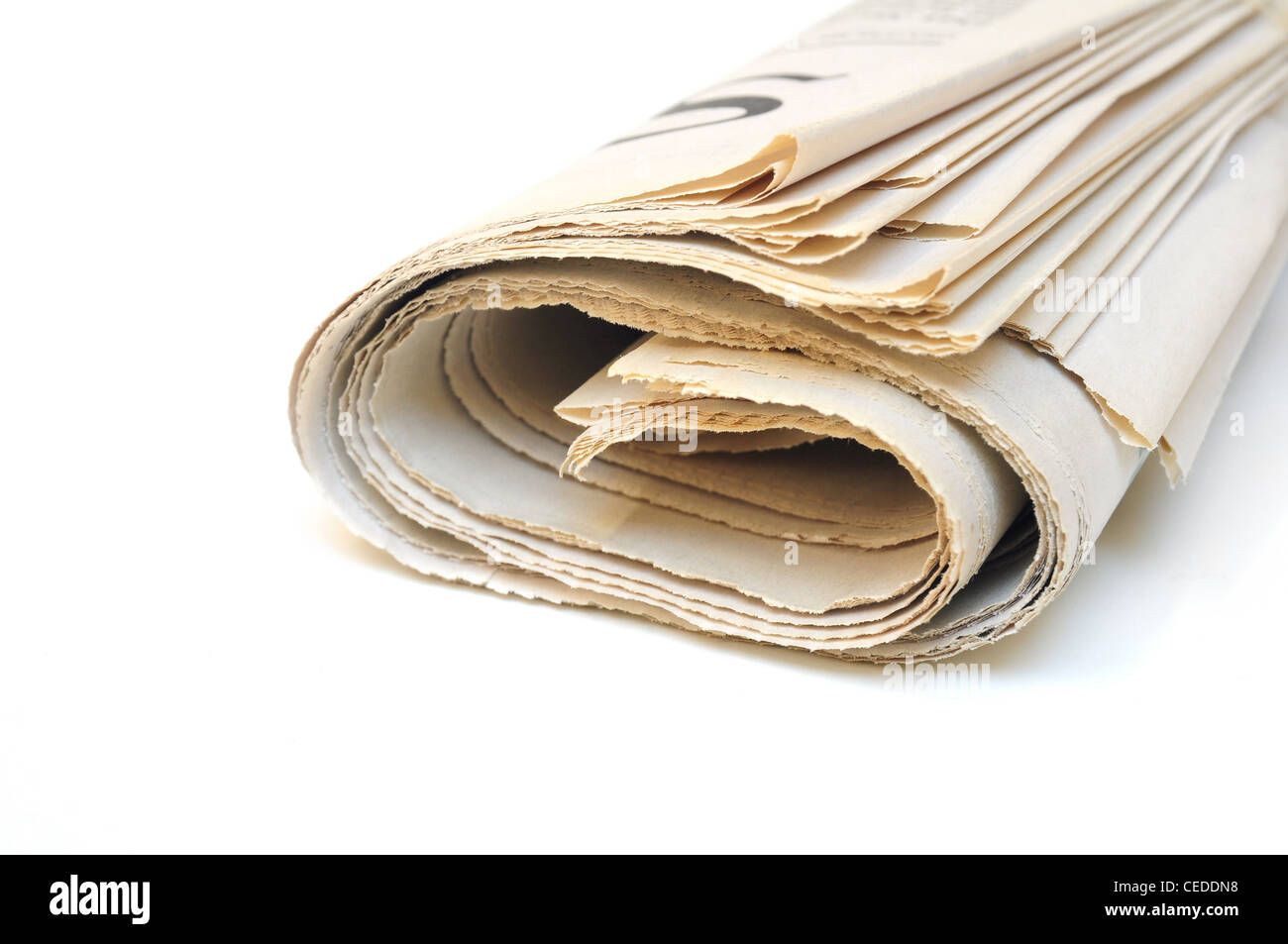 Folded newspaper on white background Stock Photo - Alamy