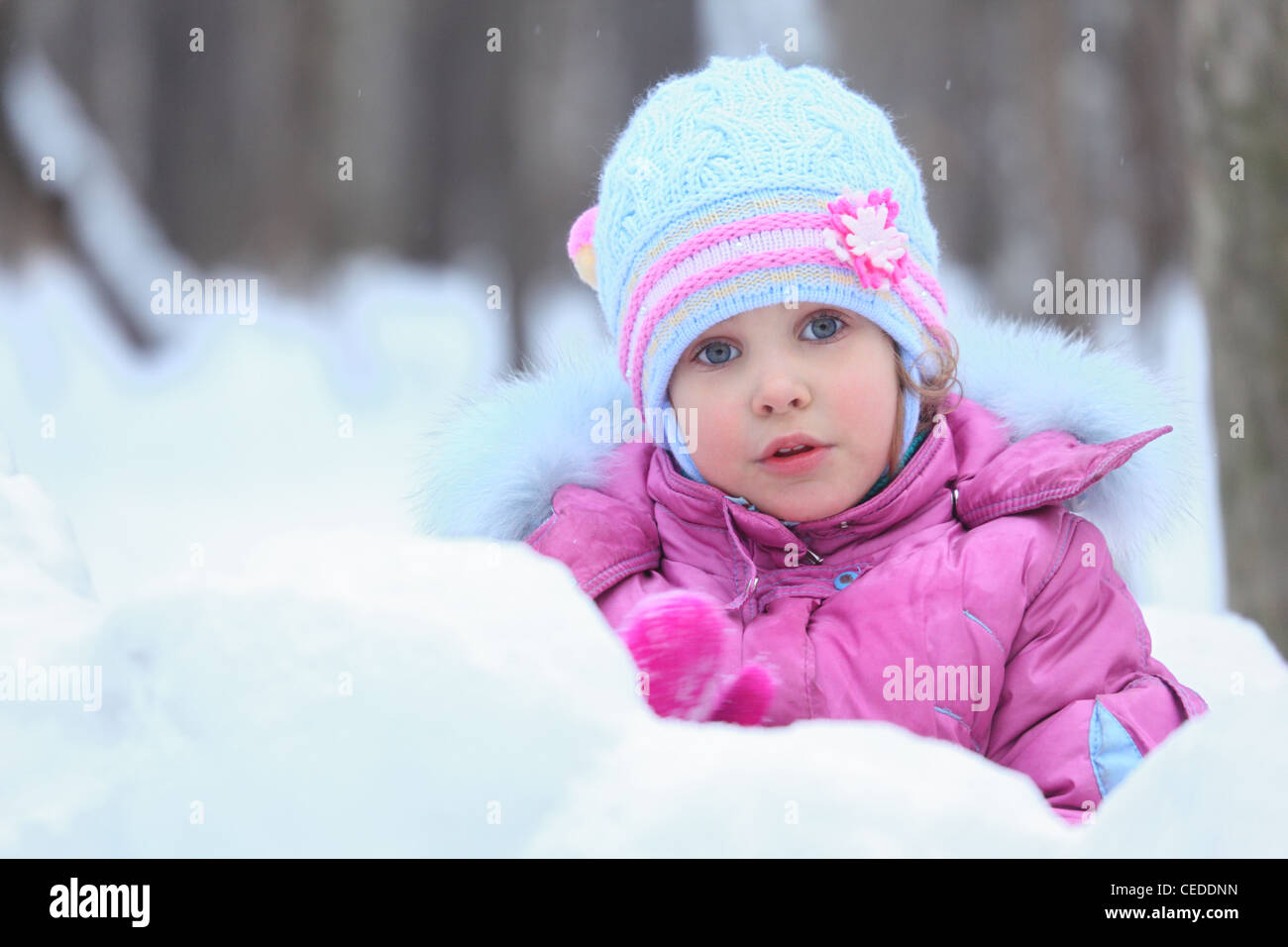 Little girl in snow Stock Photo - Alamy