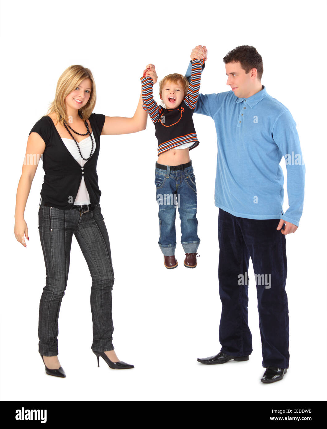 Parents hold son for hands, full body Stock Photo - Alamy
