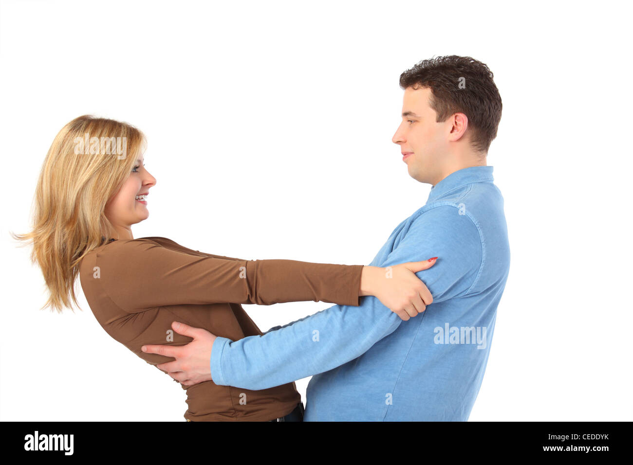 Young pair embraces Stock Photo - Alamy