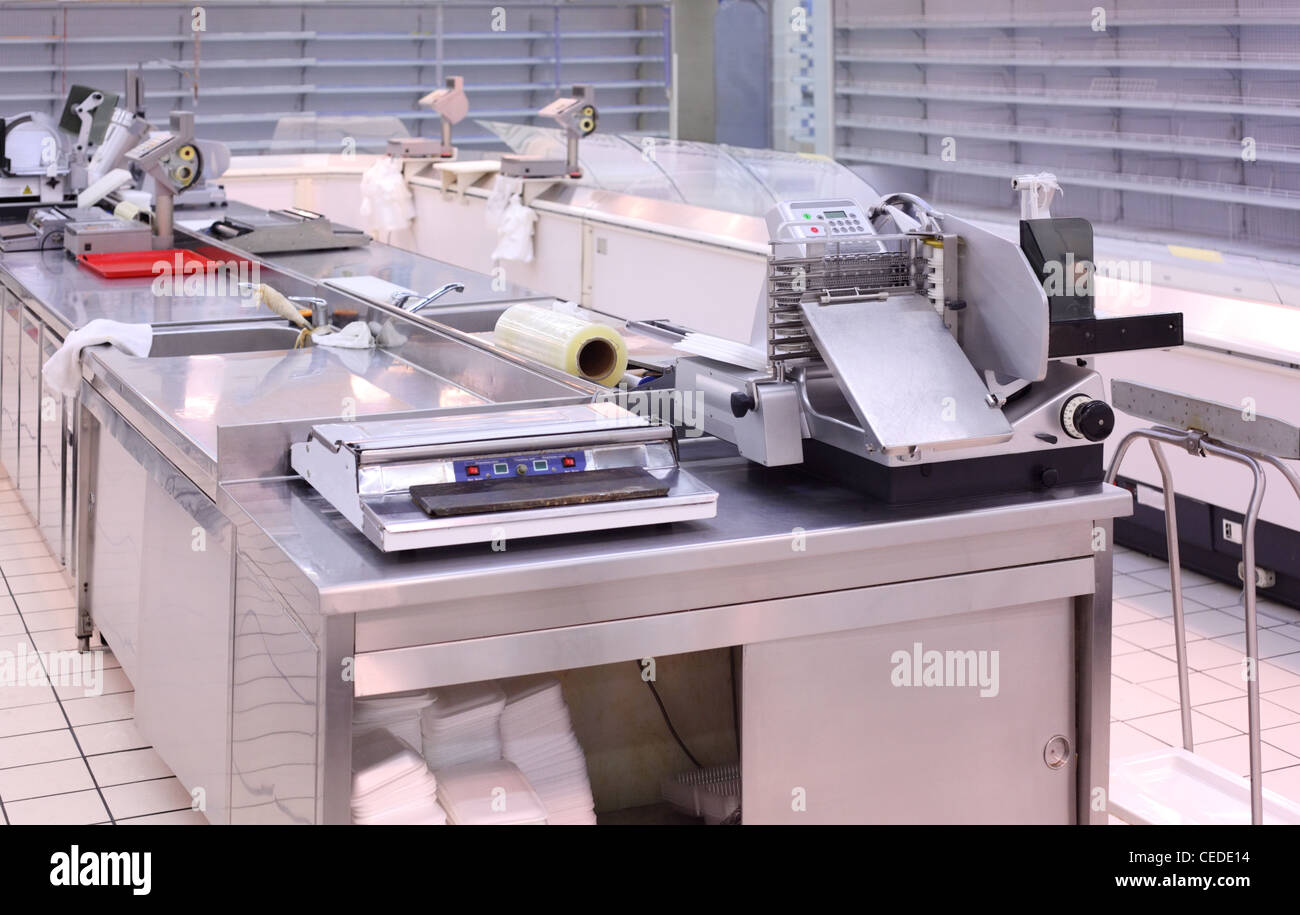Counter with trading equipment in empty shop Stock Photo - Alamy