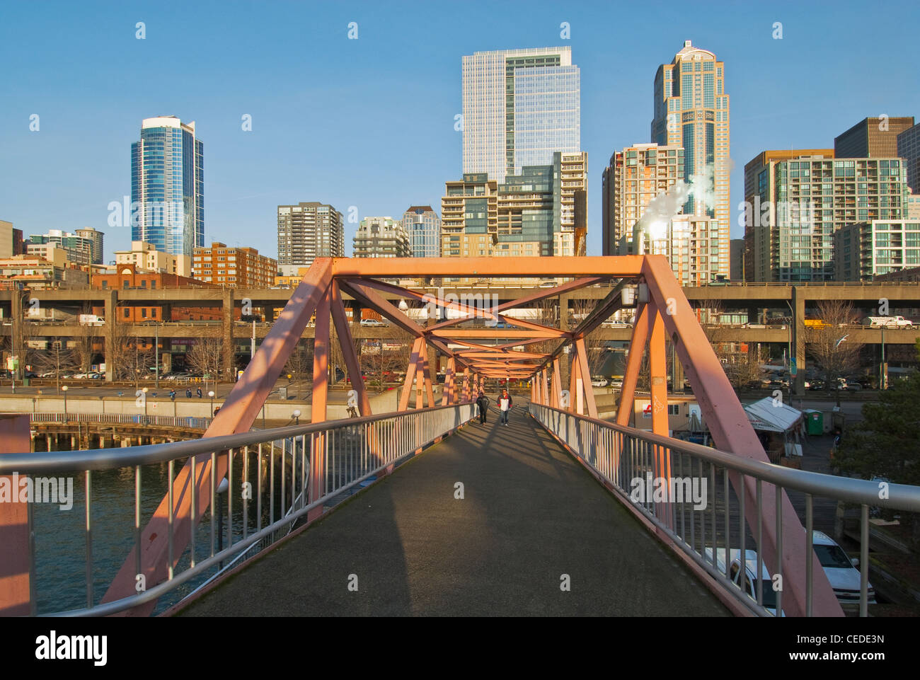 People Walk Up Ramp To Viewing Platform At Waterfront Park With Alaskan ...