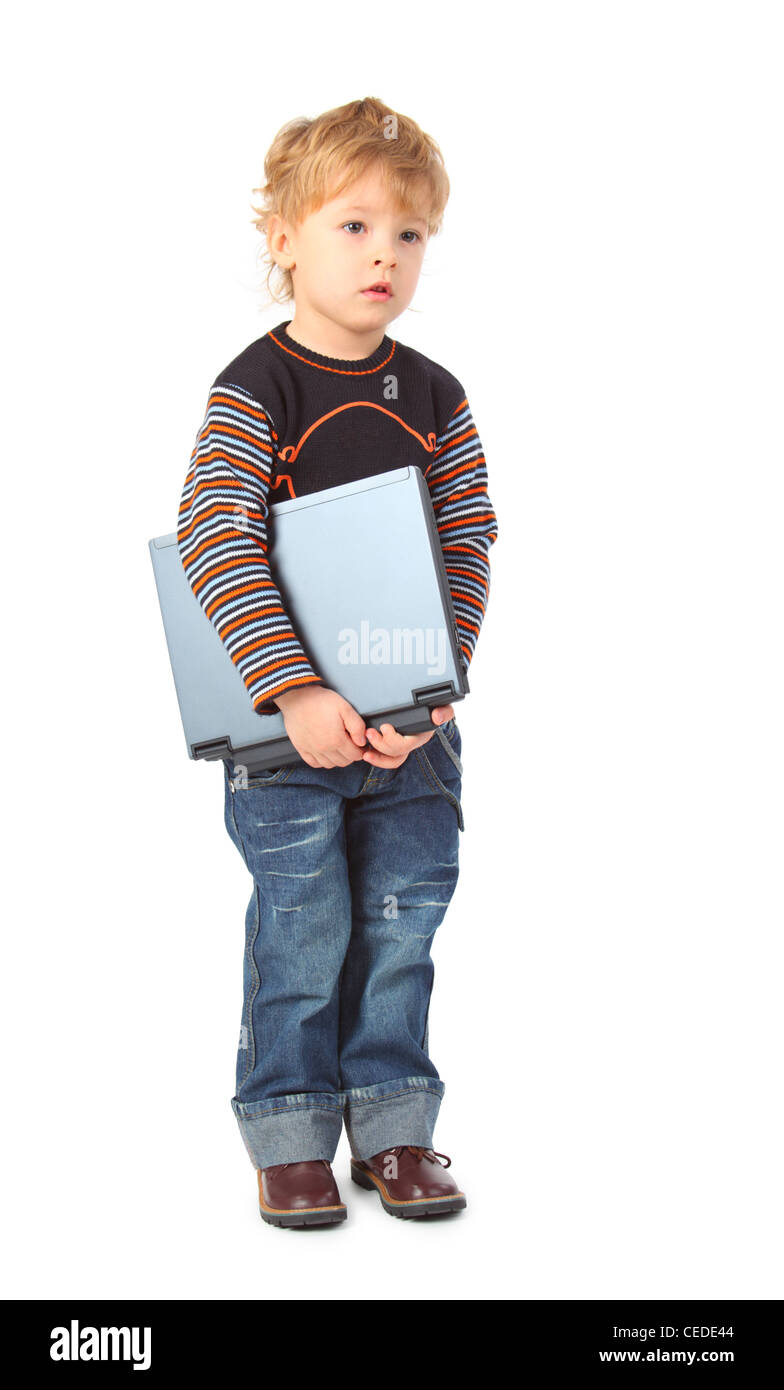 Boy stands with laptop in hands Stock Photo - Alamy