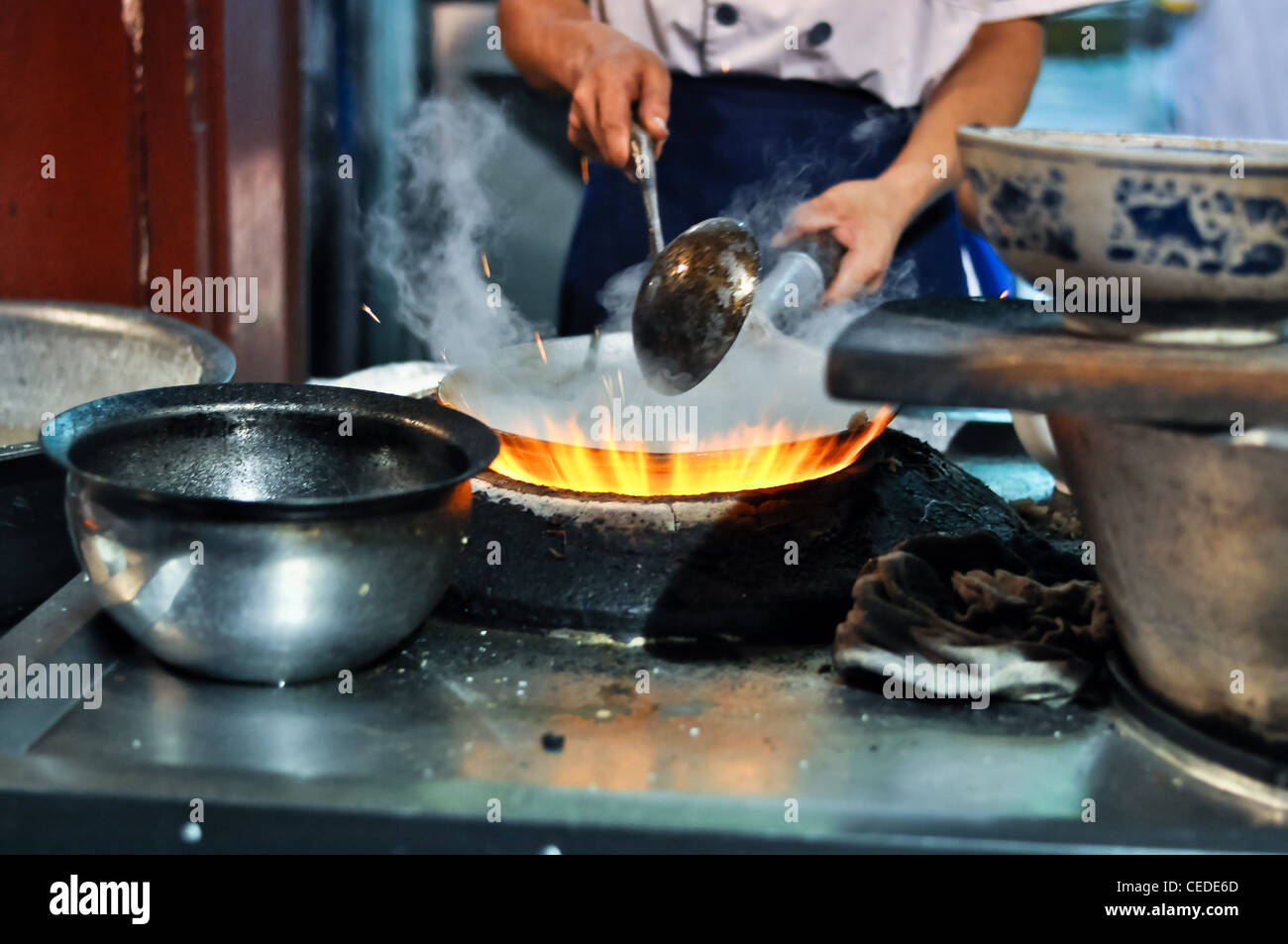 hot action at the wok Stock Photo - Alamy