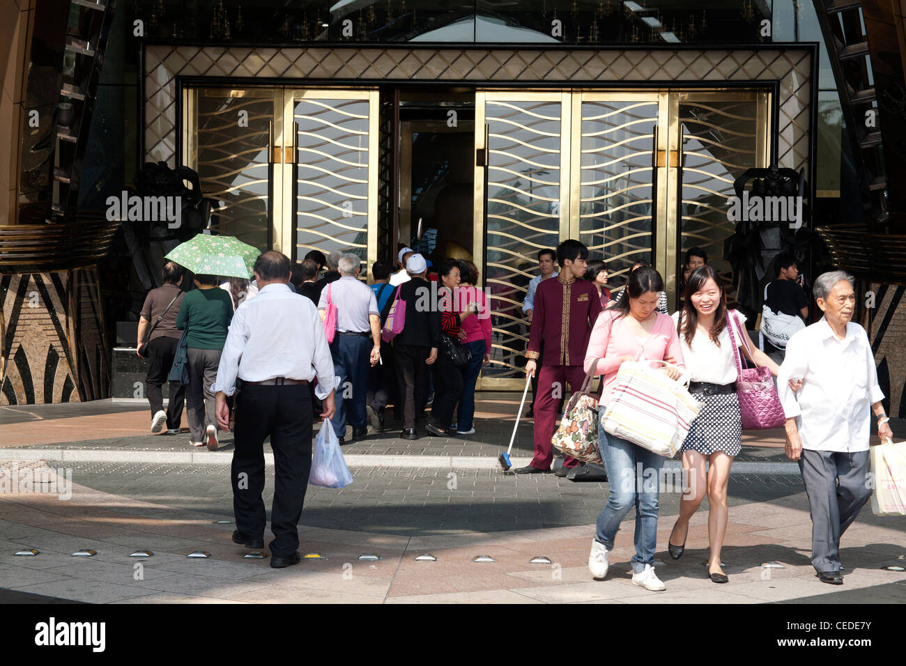 Tour party entering the Casino Grand Lisboa Macau SAR China Stock Photo ...