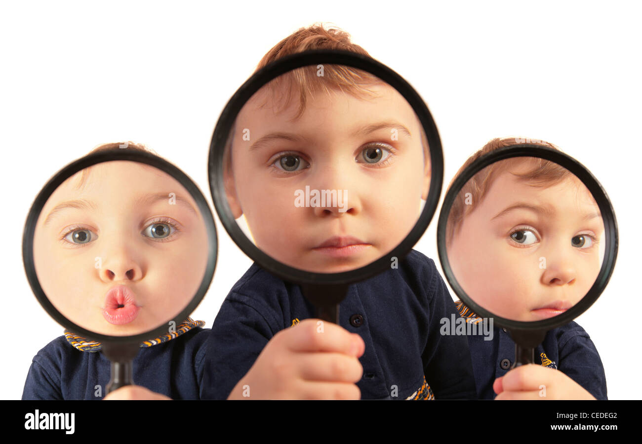 Children looking through magnifiers collage Stock Photo - Alamy