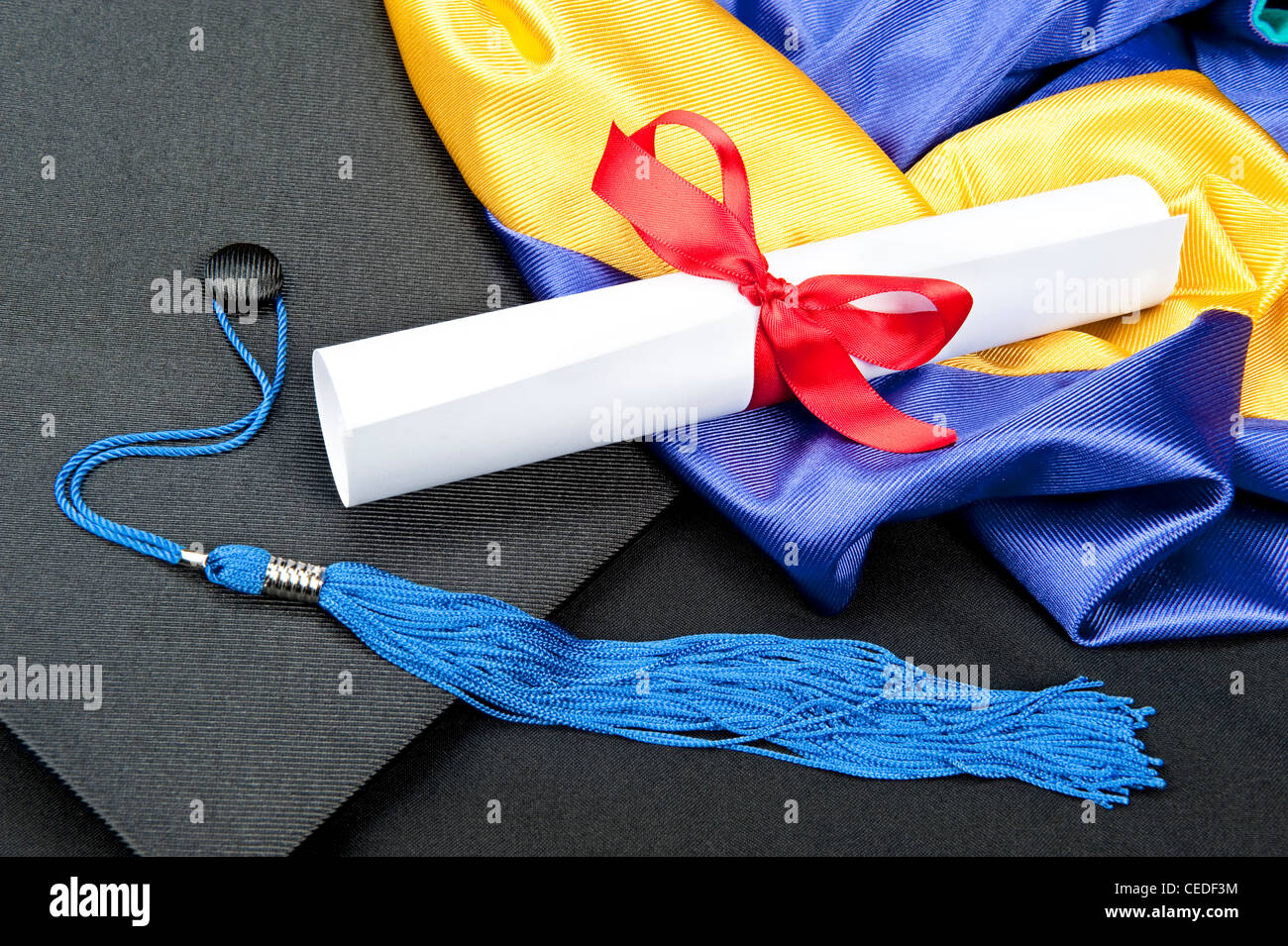 A graduation setting with cap,tassel, gown, hood and diploma Stock ...