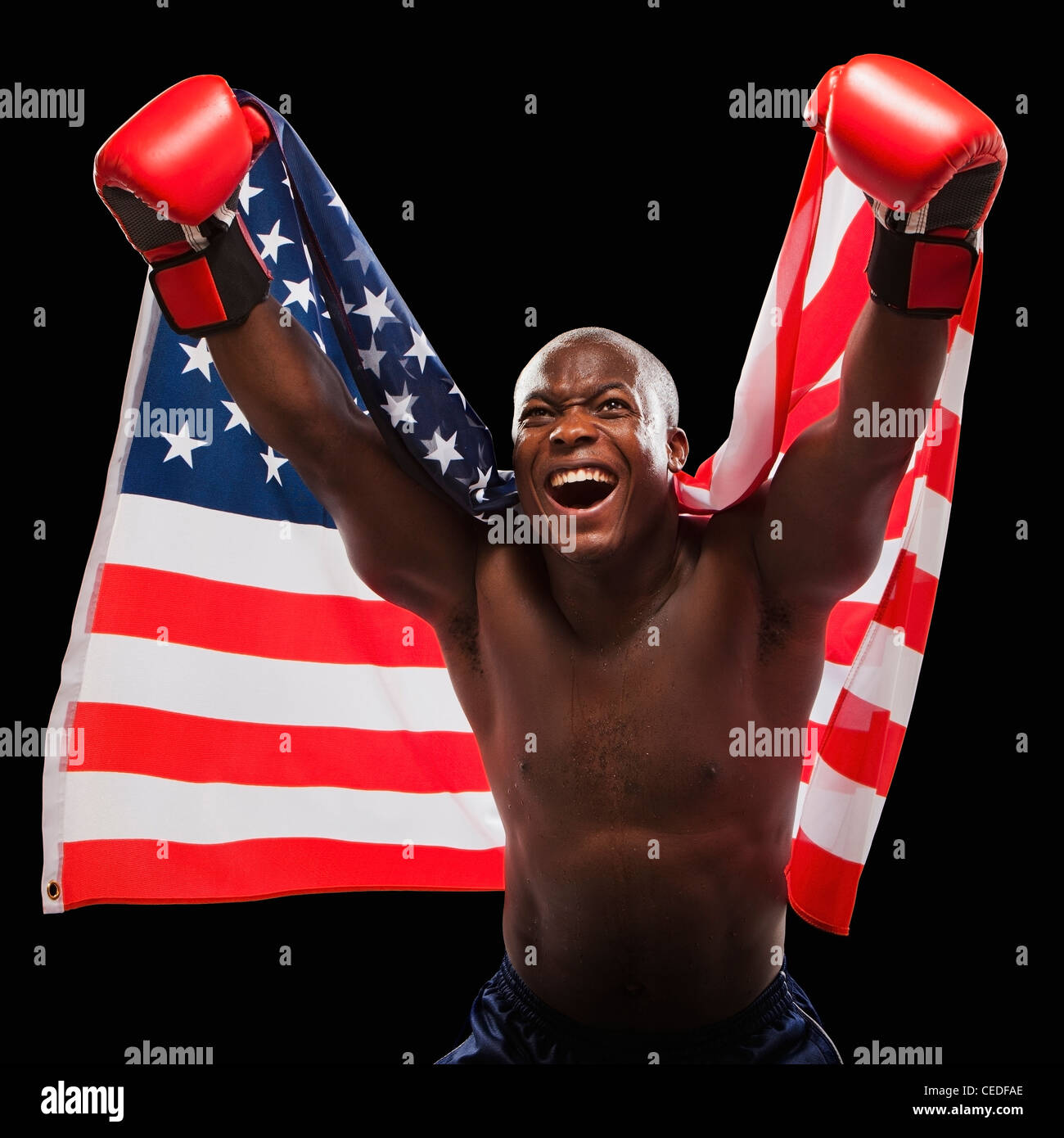 African American boxer holding American flag Stock Photo - Alamy