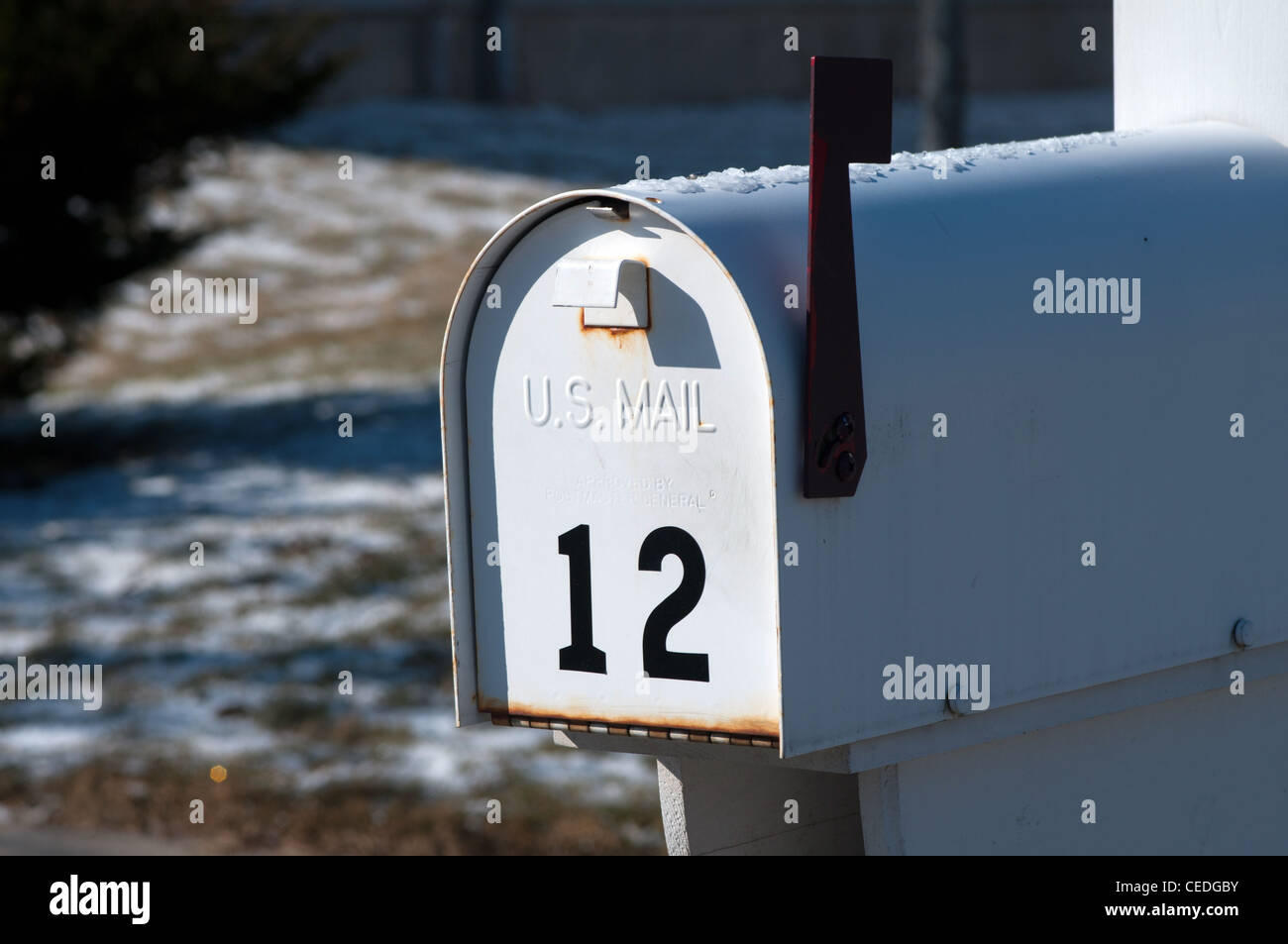White US Mail postal box with number twelve 12 Stock Photo - Alamy