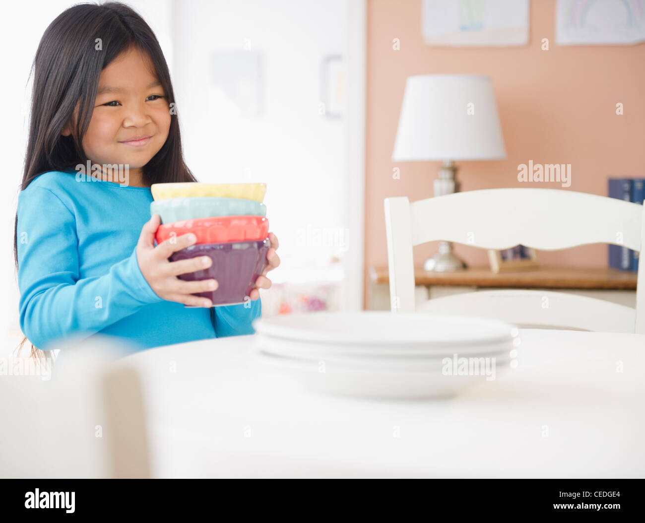 Girl Setting The Table