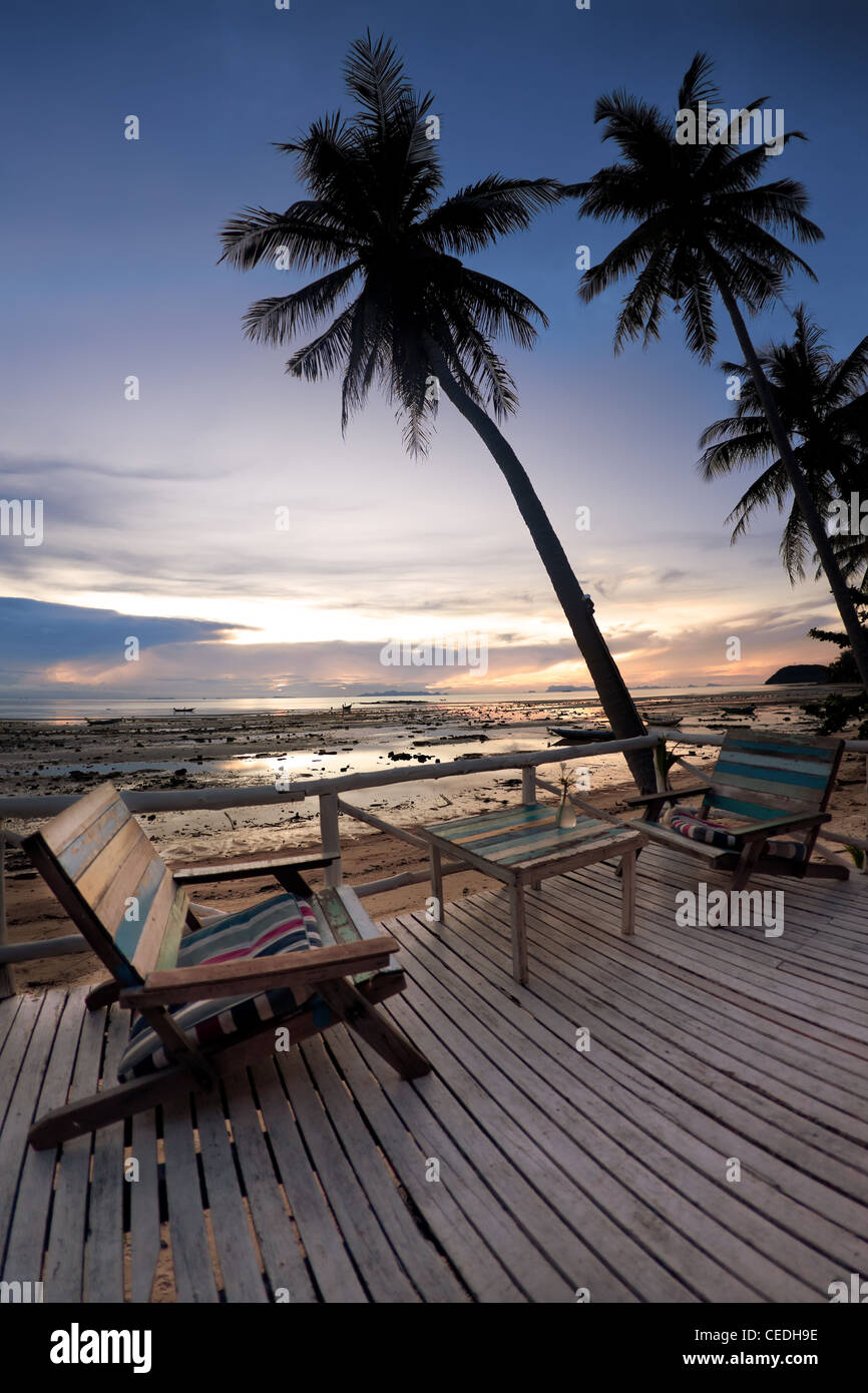 Cafe outdoor with terrace on sunset beach Stock Photo - Alamy