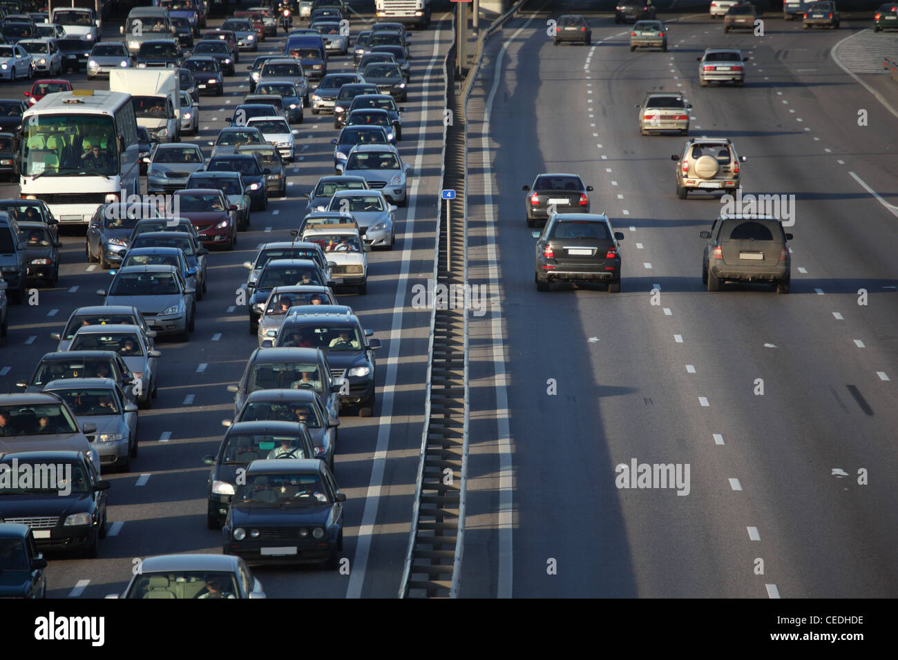 cars on highway, empty and full side Stock Photo - Alamy