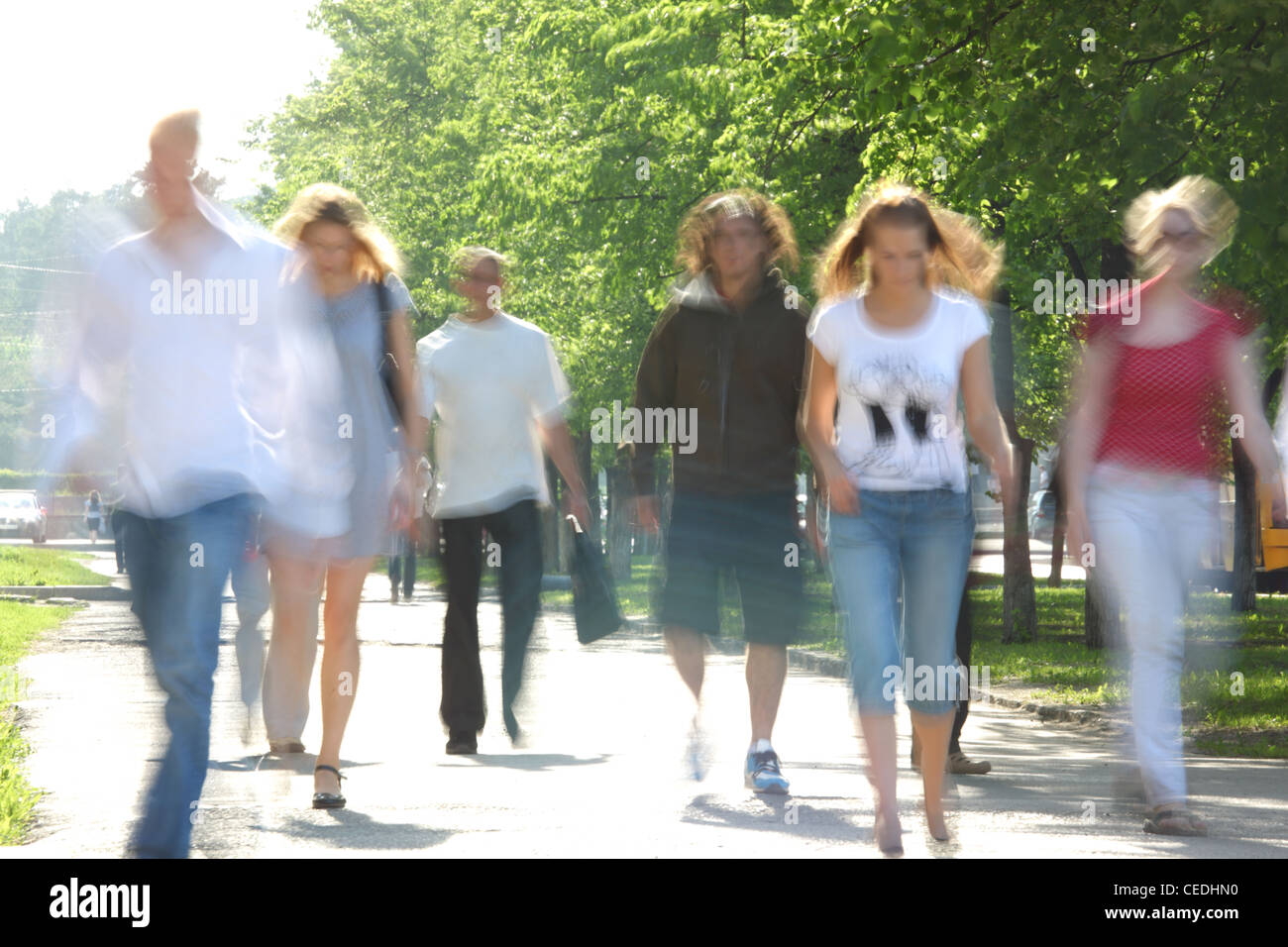 Passers-by in street in summer Stock Photo - Alamy