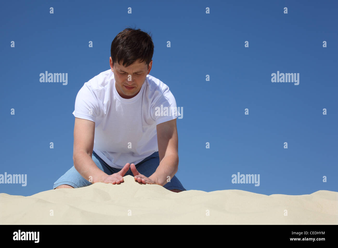 Boy plays in the sand hi-res stock photography and images - Alamy