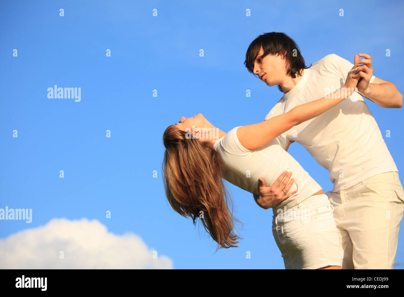 Man holds woman by waist hi-res stock photography and images - Alamy