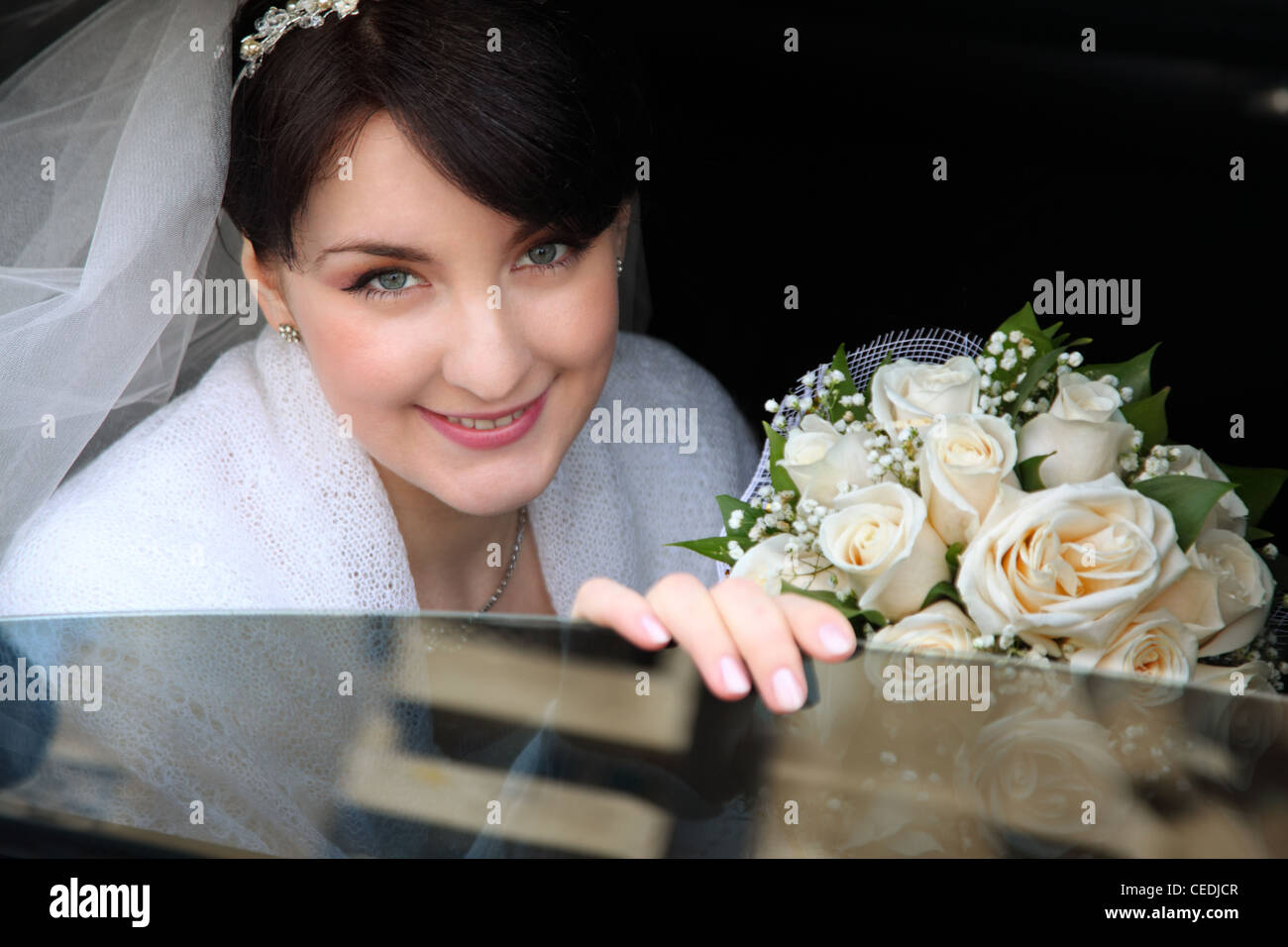 happy bride in the car Stock Photo - Alamy