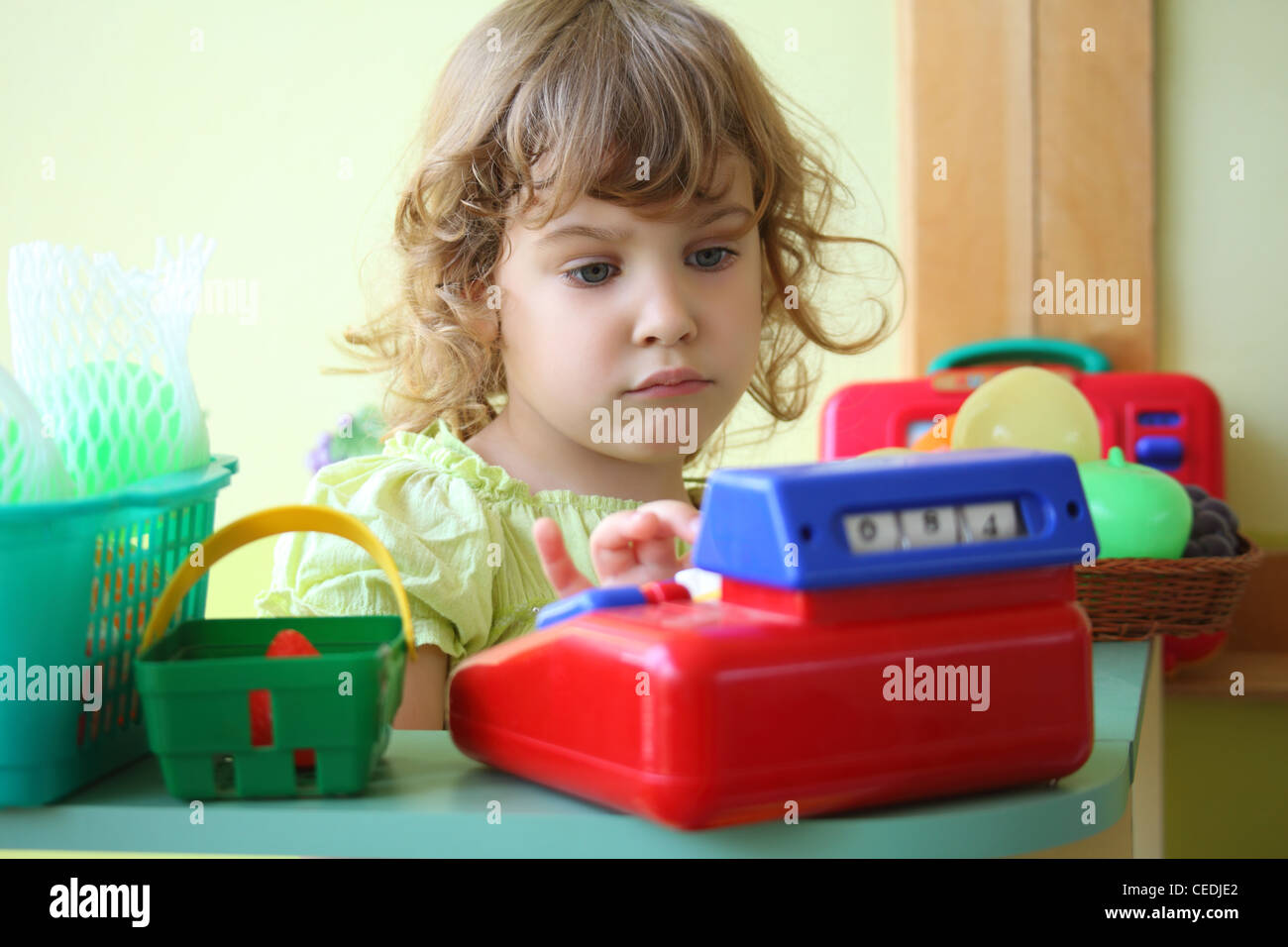 little girl plays shop Stock Photo - Alamy