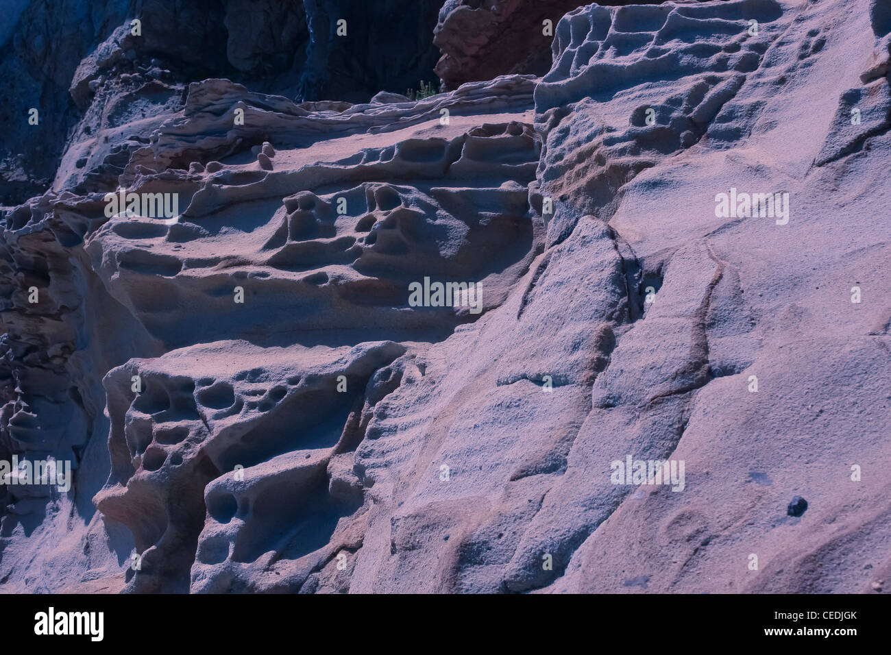 A wall formed of rock in moonlight Stock Photo - Alamy