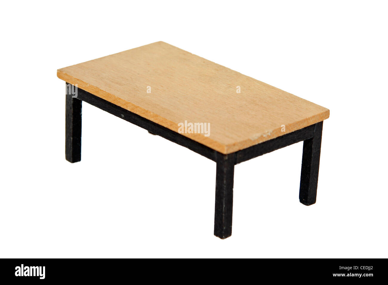 Close up shot of a miniature table over white Stock Photo - Alamy