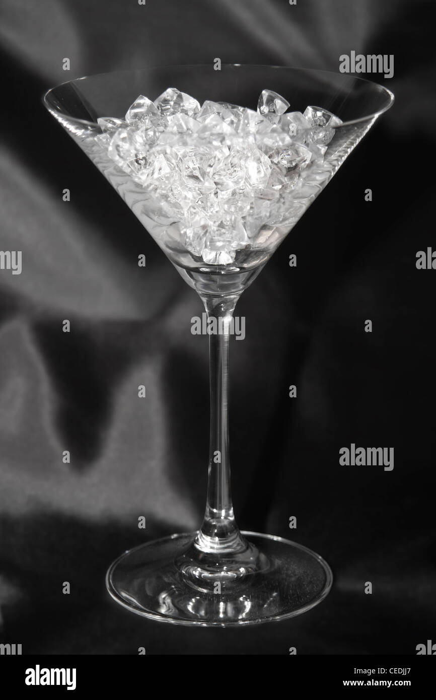 A v-shaped cocktail glass filled with diamonds Stock Photo - Alamy