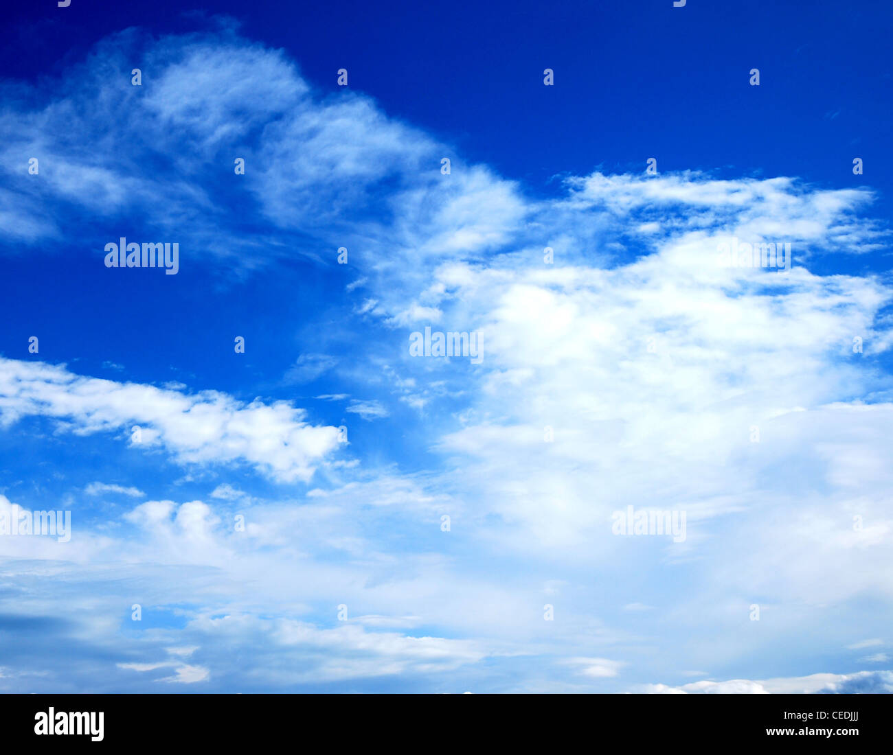 Blue sky with white clouds Stock Photo - Alamy