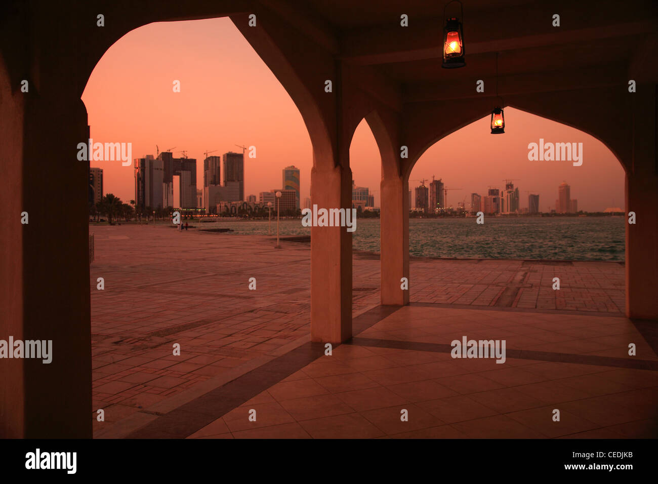 Doha corniche at sunset with downtown Doha on the horizon Stock Photo ...