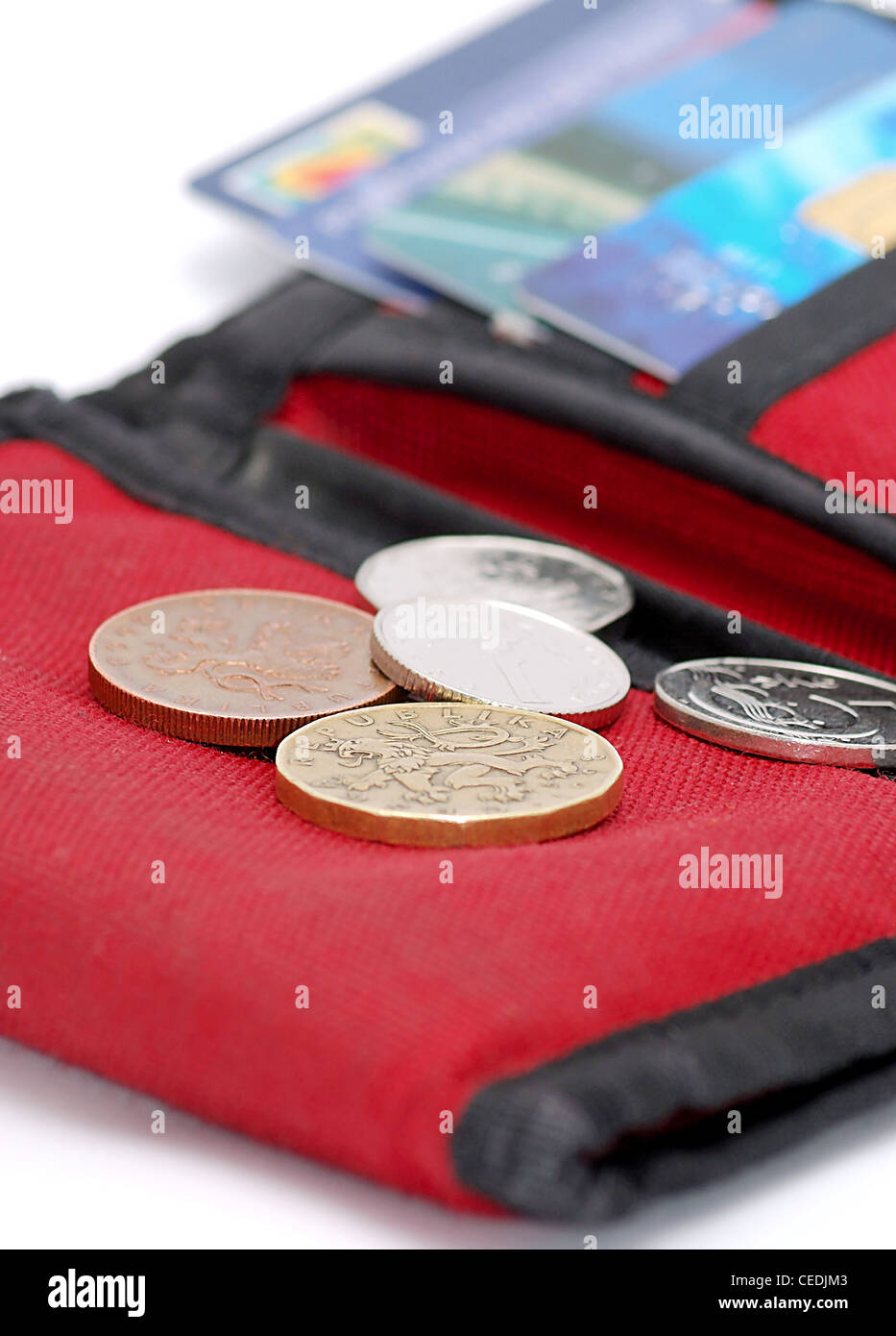 Detail image of red wallet with cards and coin Stock Photo - Alamy