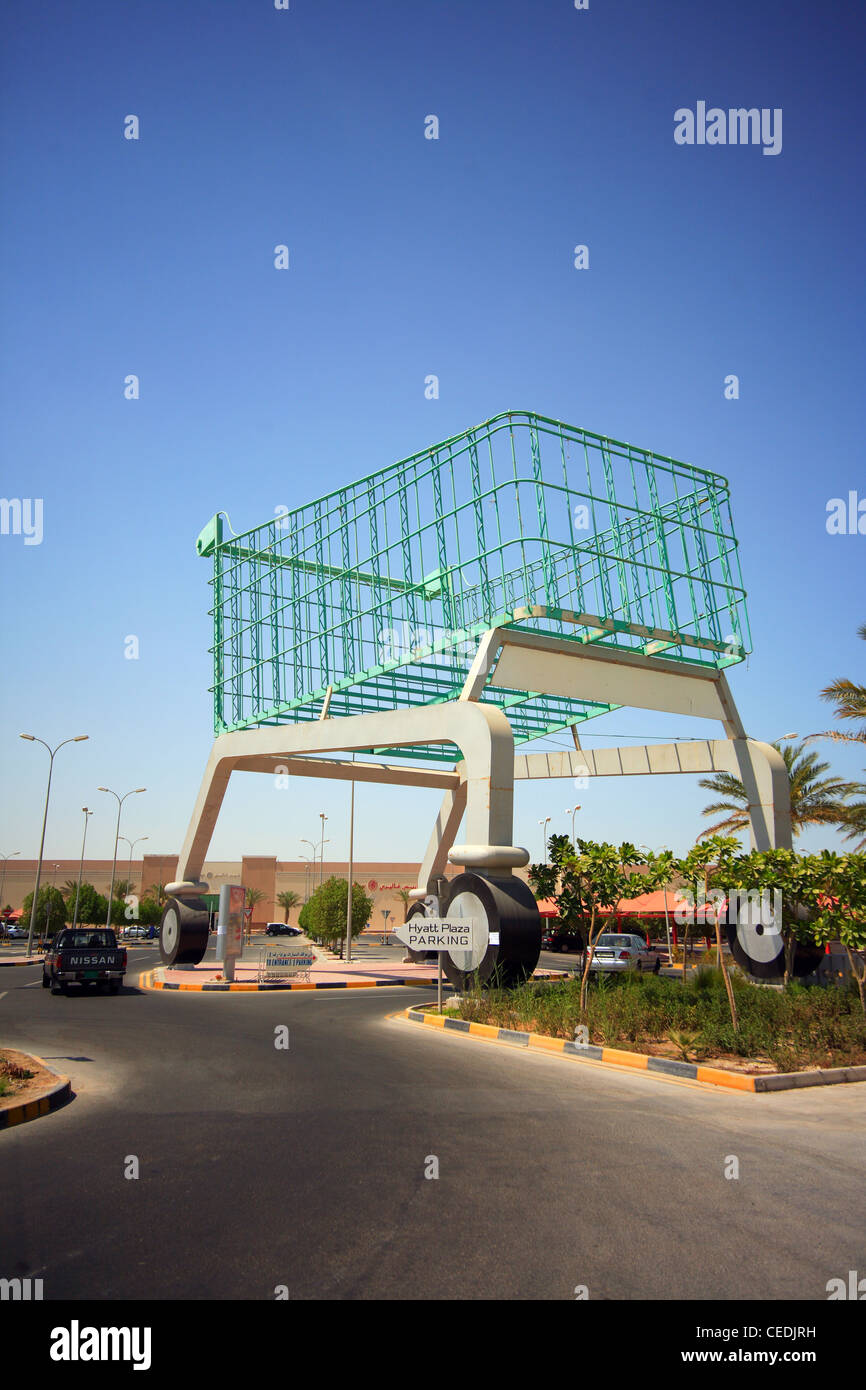 A massive shopping trolley stood in the car park of the Hyatt Plaza ...