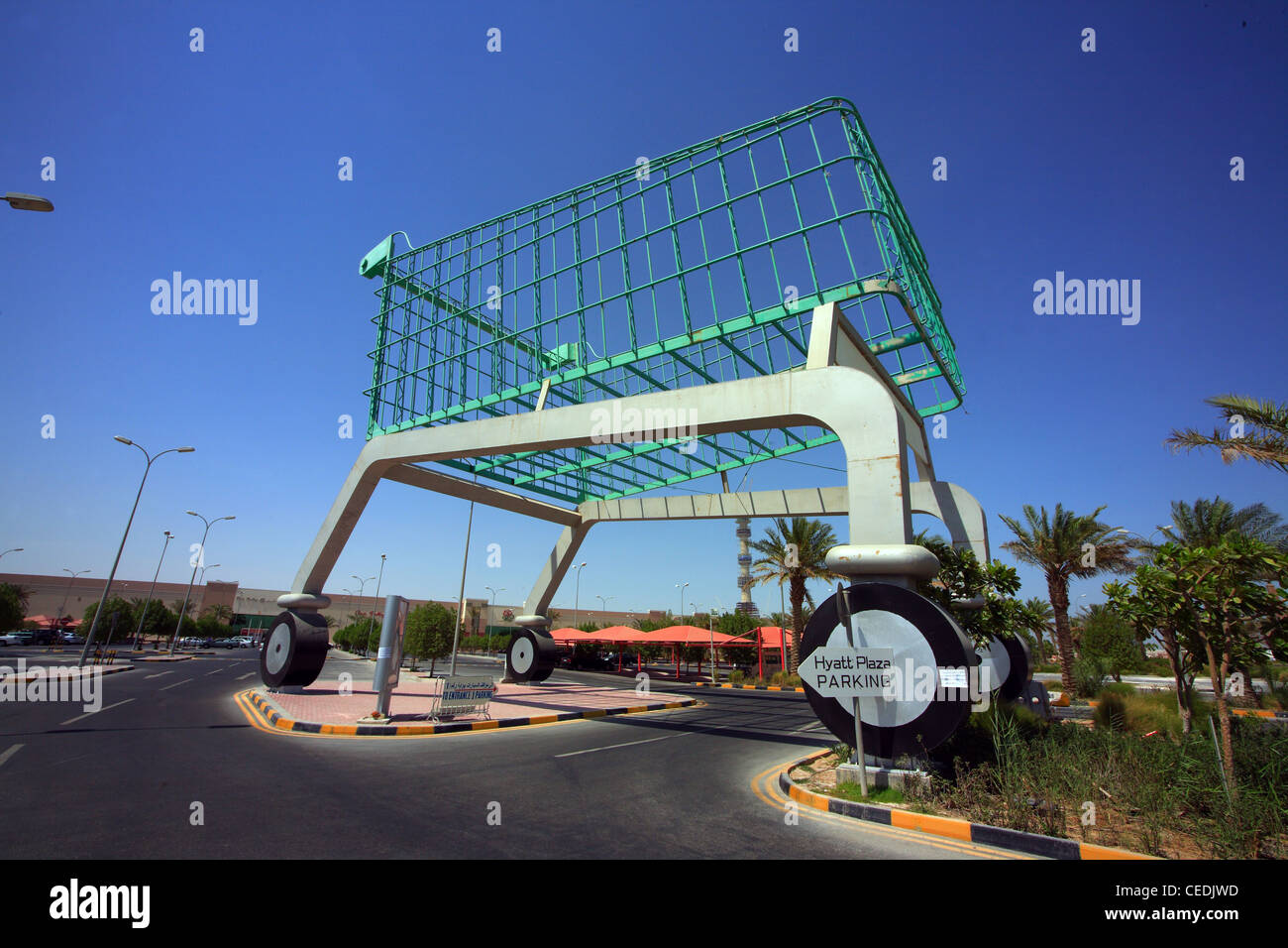 A massive shopping trolley stood in the car park of the Hyatt Plaza ...