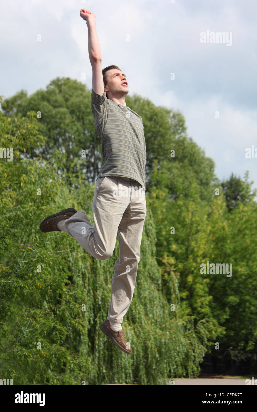 young man jumps outdoor Stock Photo - Alamy