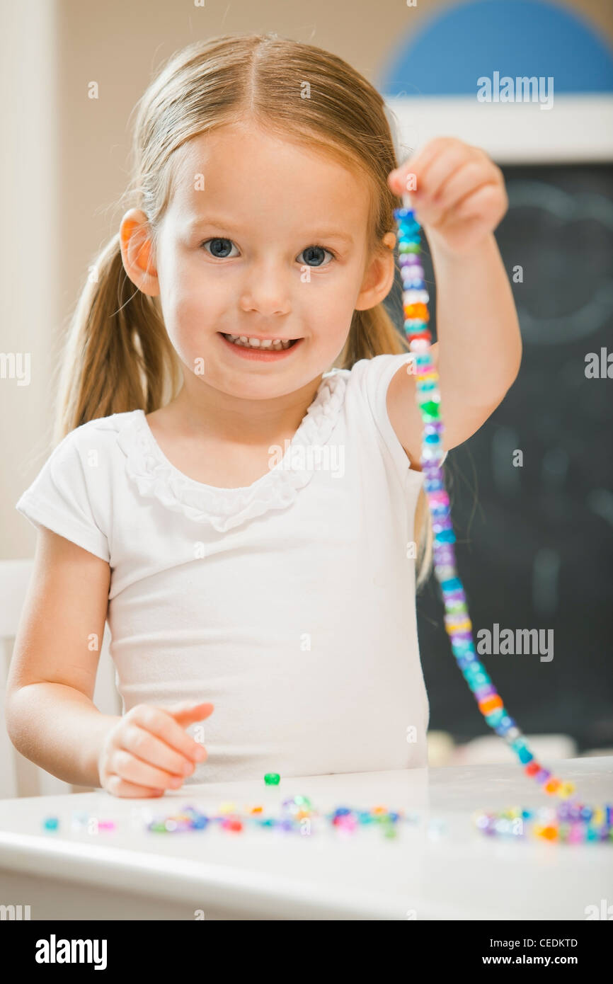 Stringing hi-res stock photography and images - Alamy