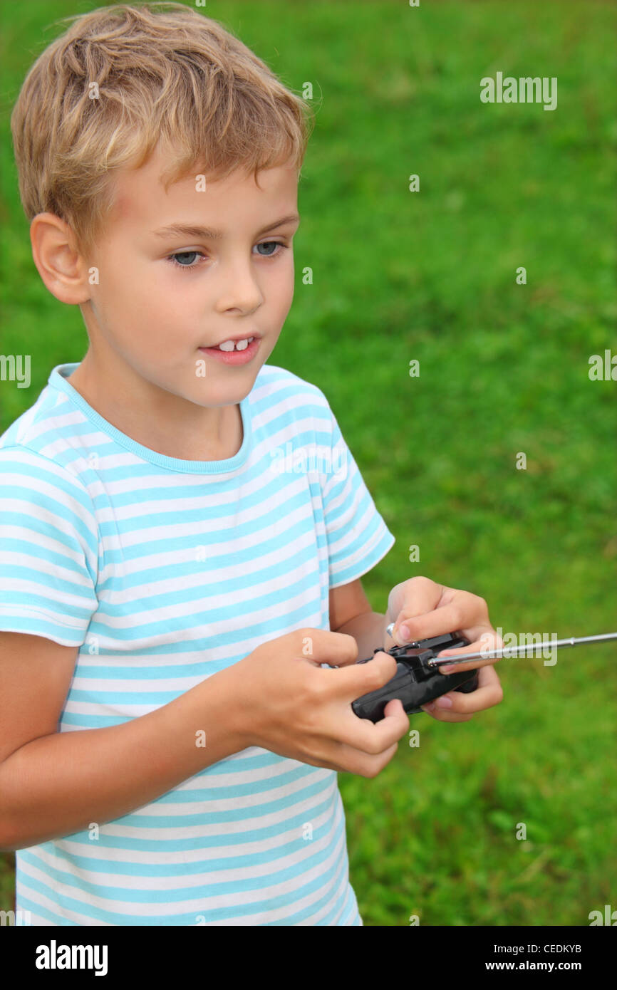 boy with panel for radio control in hands Stock Photo - Alamy
