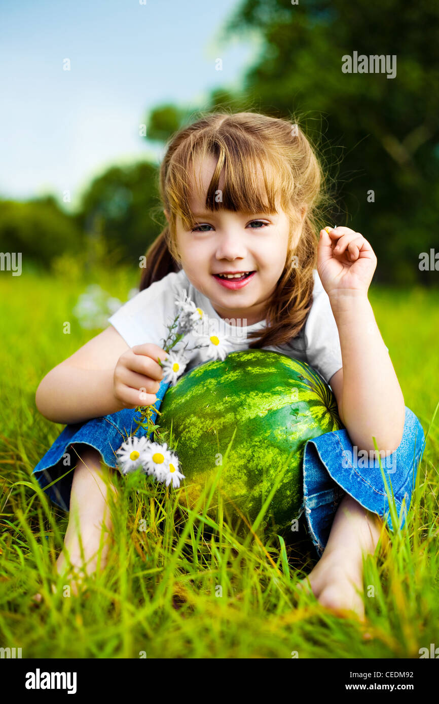 happy girl eating water melon Stock Photo - Alamy