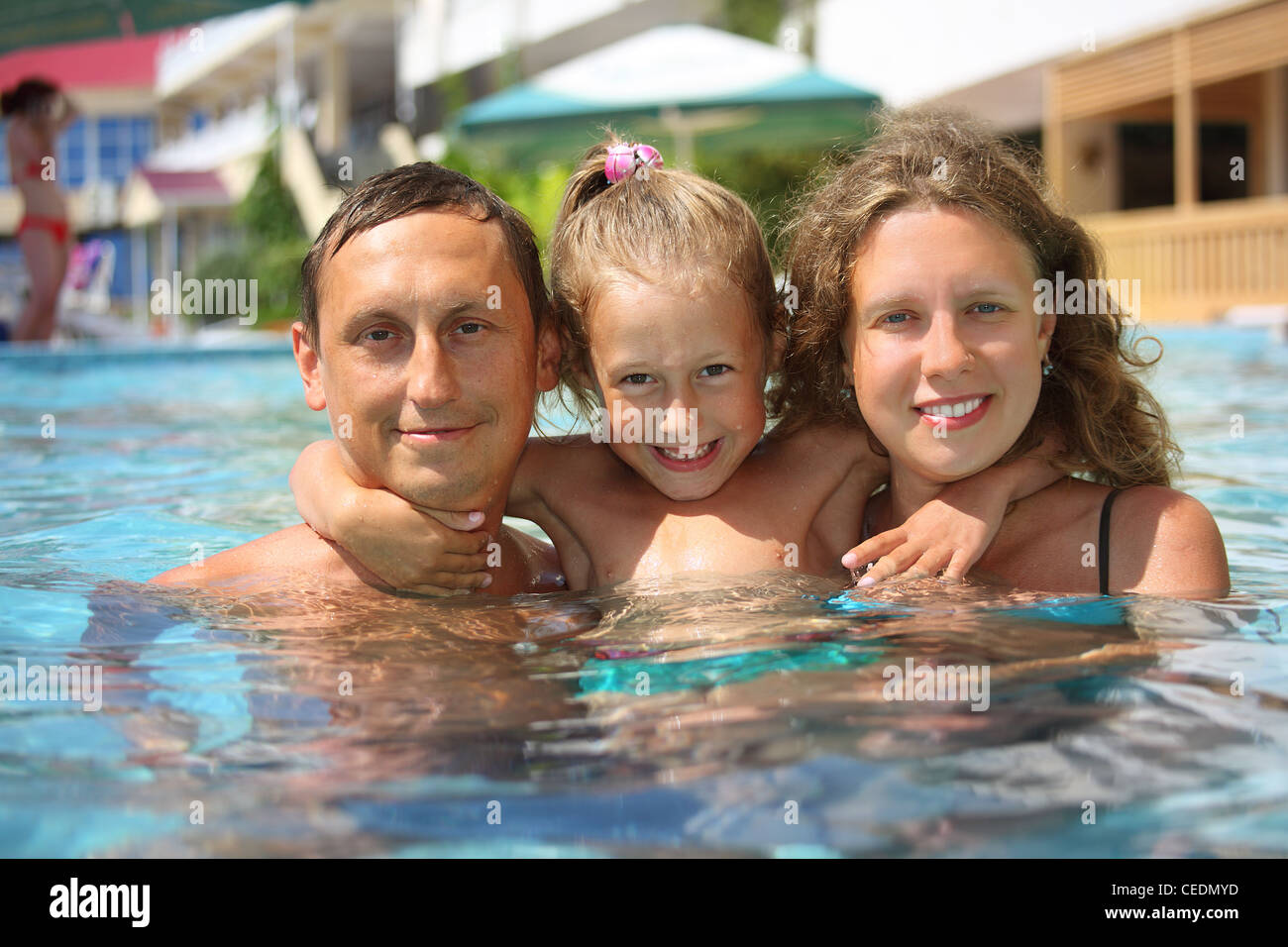 Mother daughter hug in pool hi-res stock photography and images - Alamy