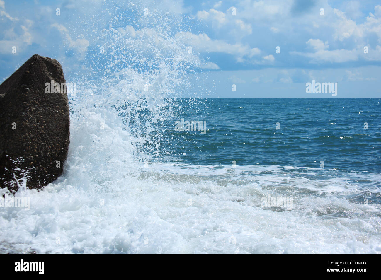 surf and rock Stock Photo - Alamy