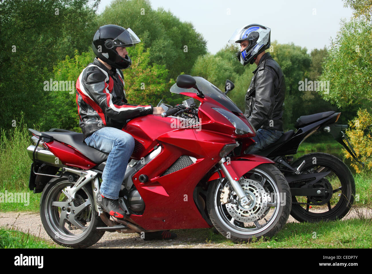Motorcyclist standing on country hi-res stock photography and images ...