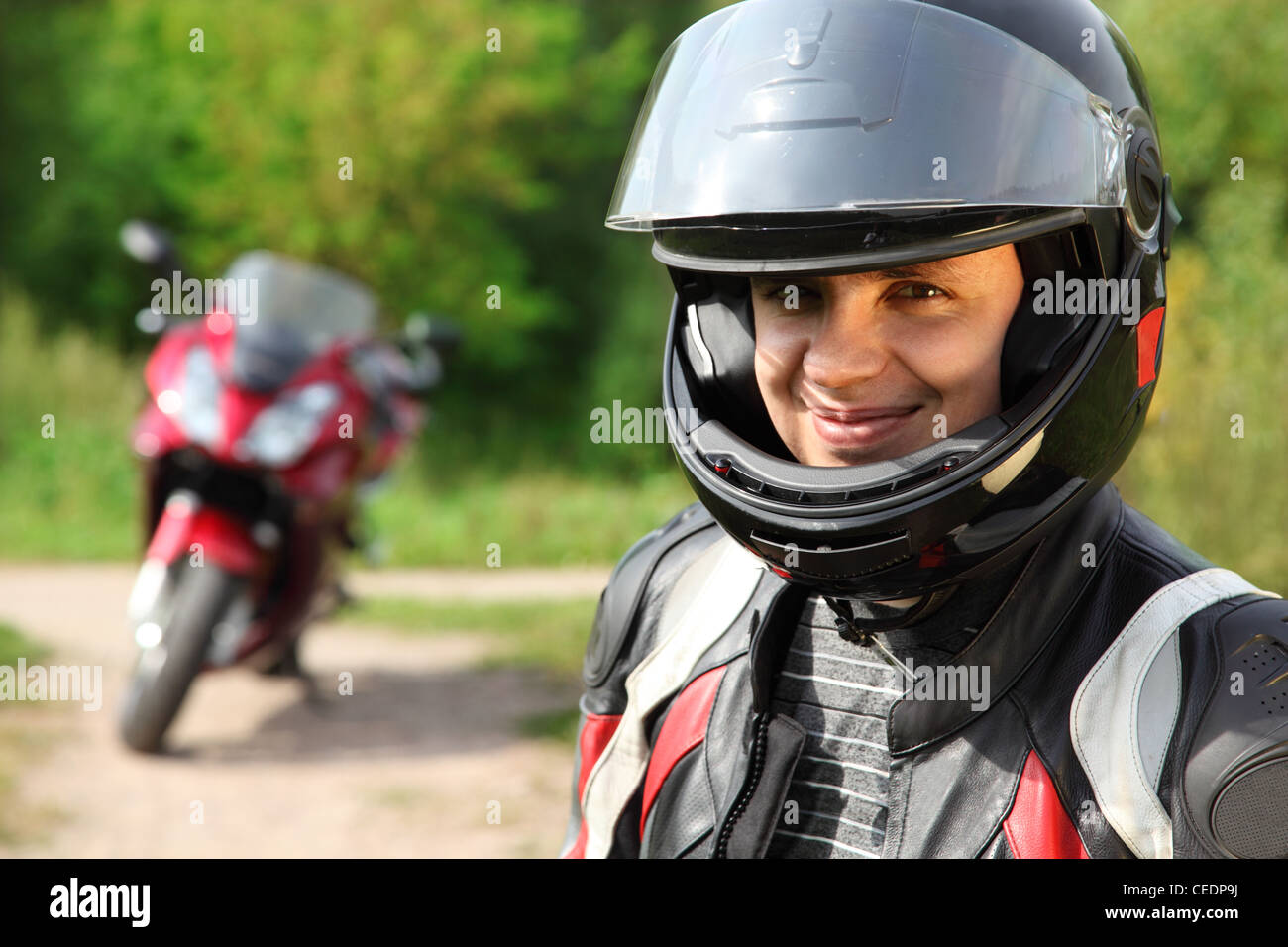 Happy motorcyclist hi-res stock photography and images - Alamy