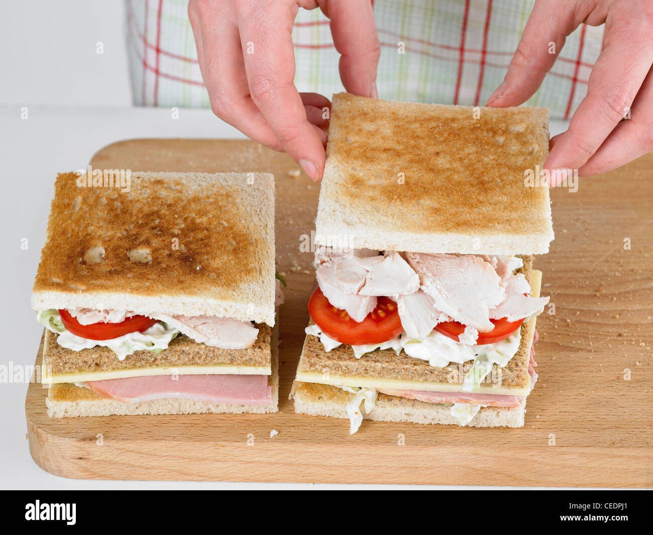 Making a club sandwich Stock Photo - Alamy