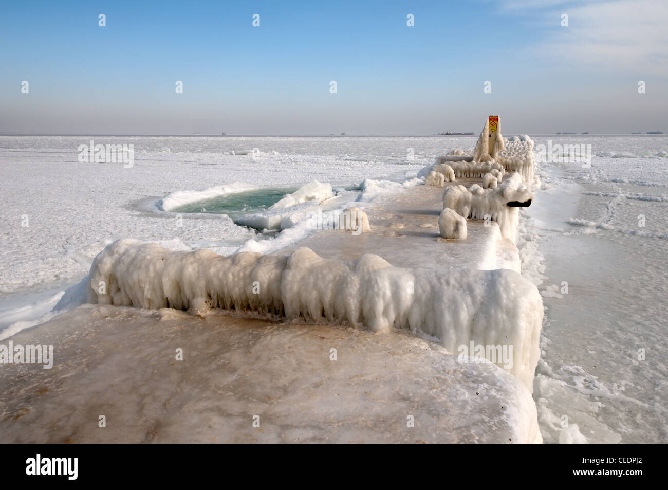 Icy pier, frozen Black Sea, a rare phenomenon, Odessa, Ukraine, Eastern ...