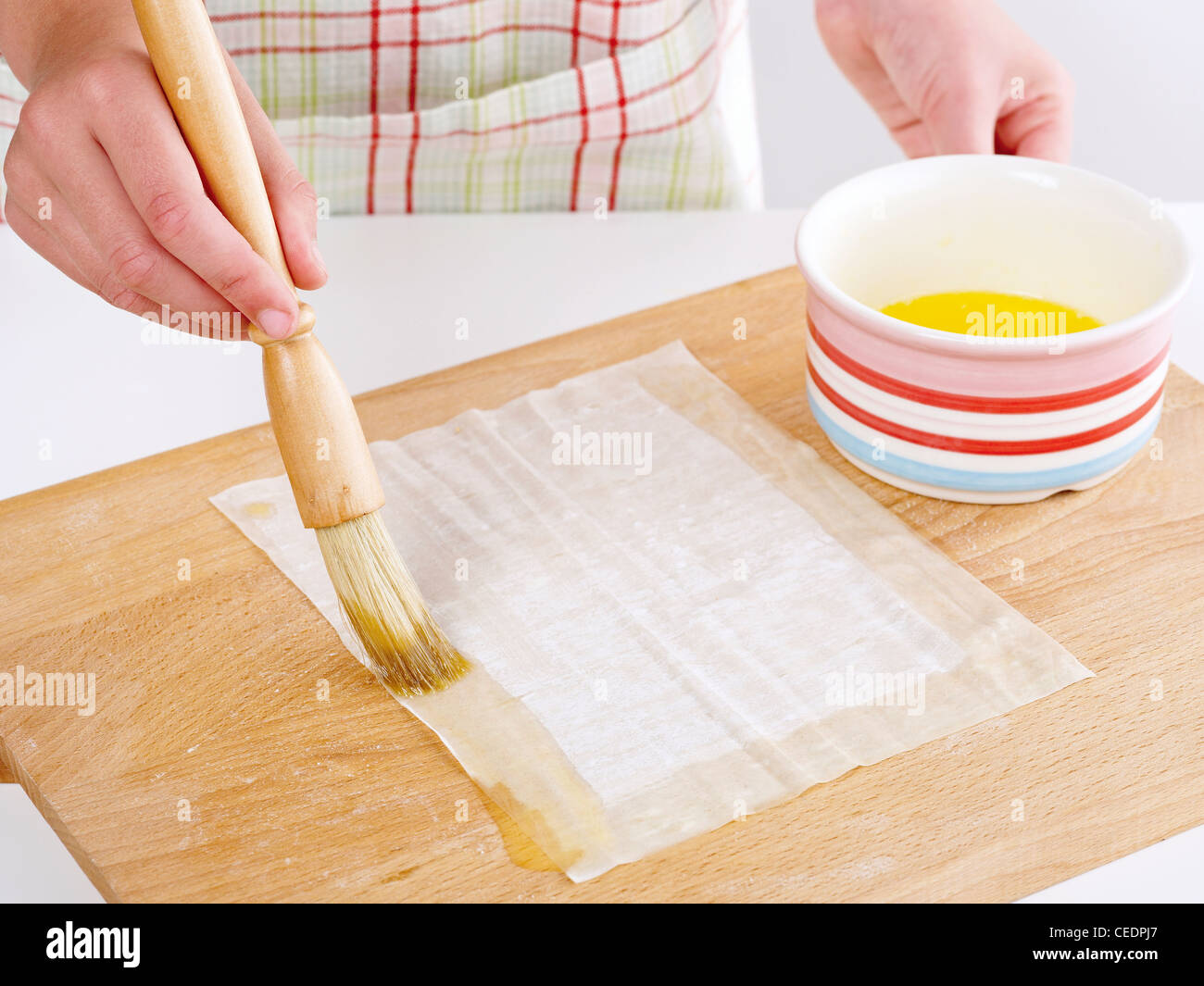 Making spring rolls Stock Photo - Alamy