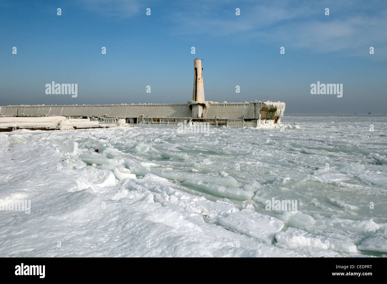 Icy pier, frozen Black Sea, a rare phenomenon, Odessa, Ukraine, Eastern ...