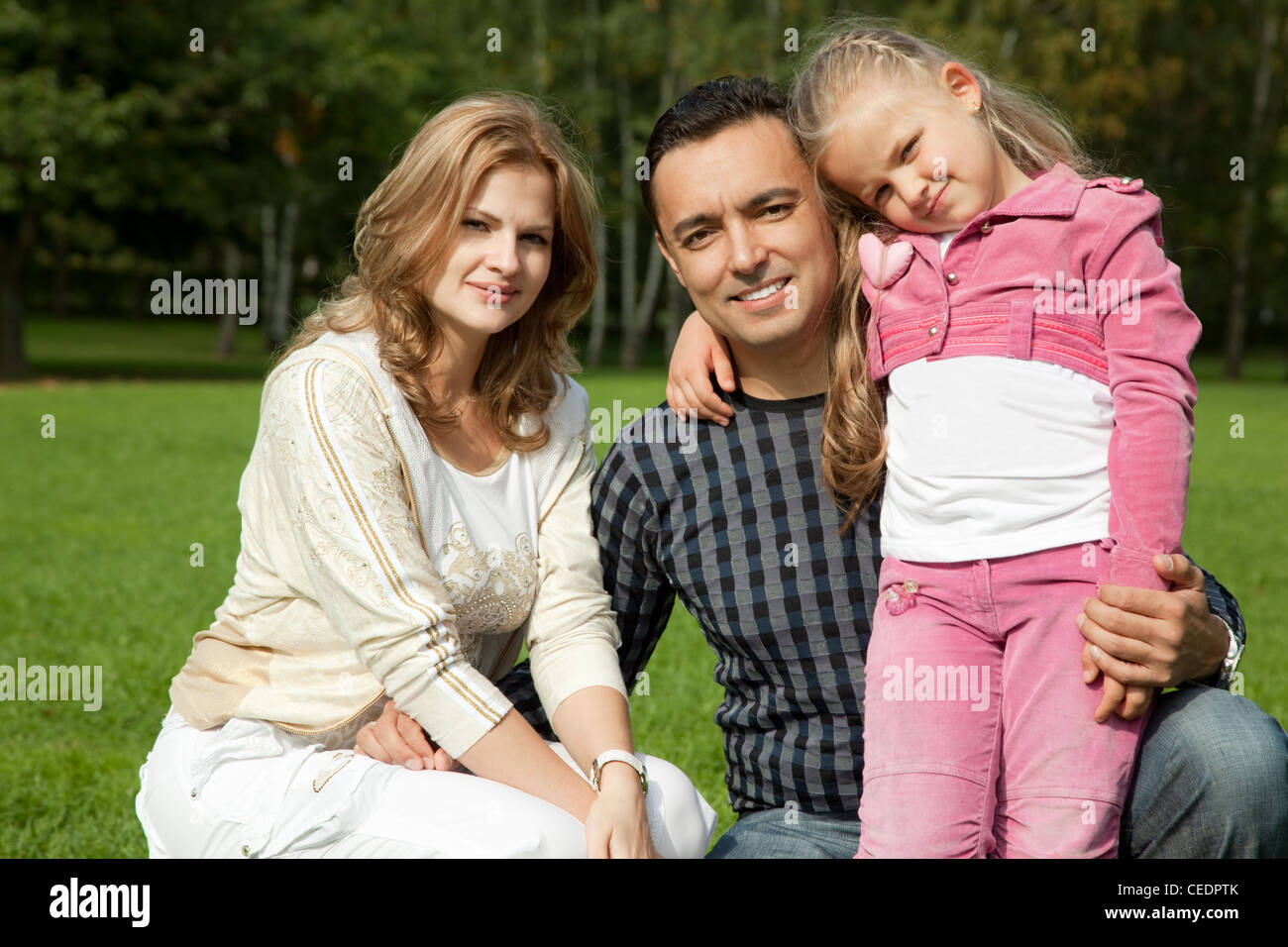 happy family of three outdoors Stock Photo - Alamy